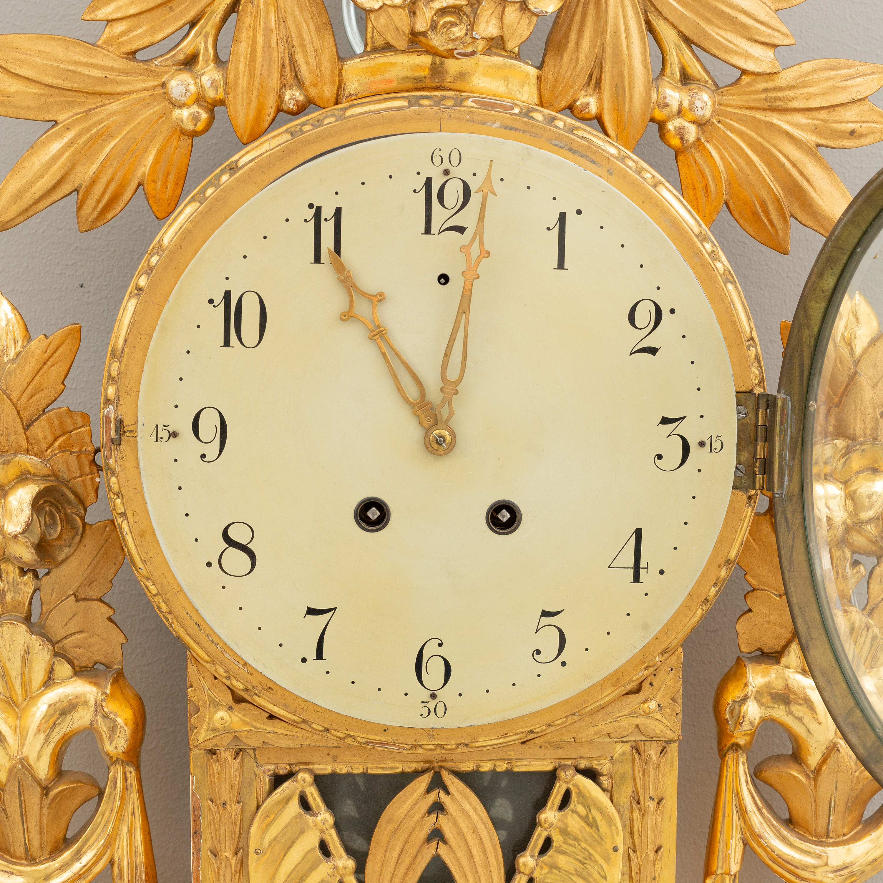 A first half of the 20th century Gustavian style wall clock. - Bukowskis