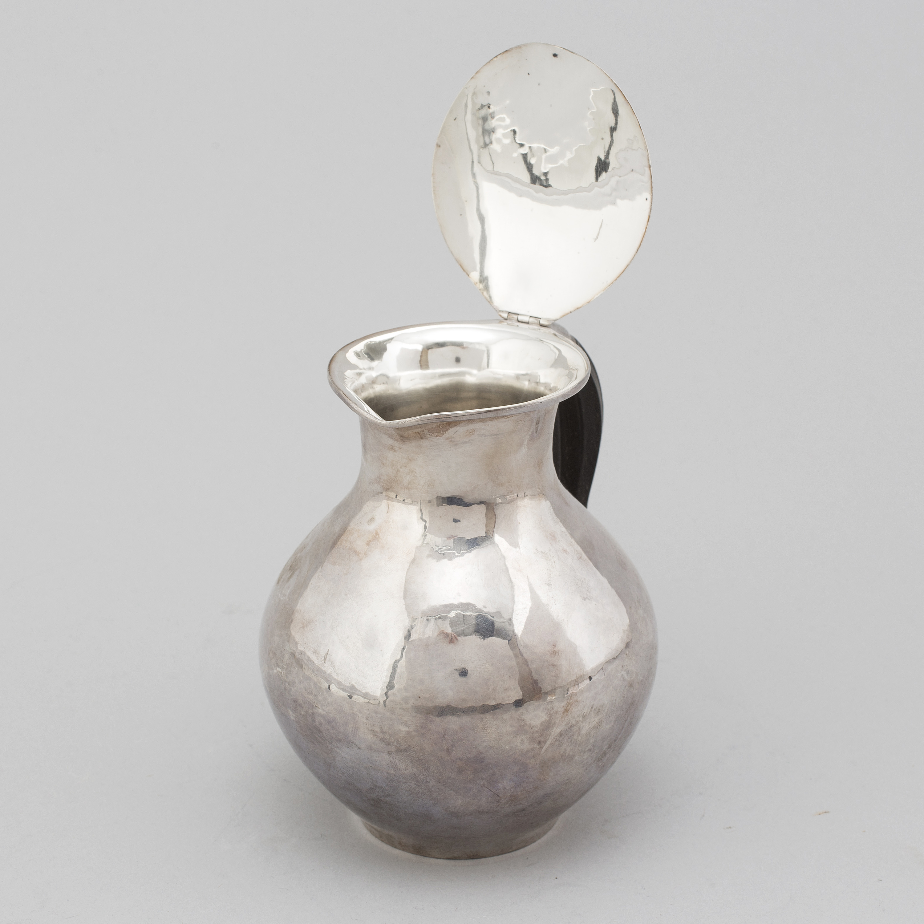 JOHAN ROHDE, A sterling silver pitcher, Georg Jensen, design no 385 ...