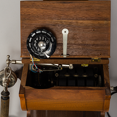 A 1914 wall mouonted telephone by L. M. Ericsson, Stockholm. - Bukowskis