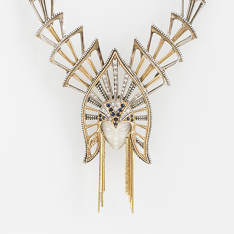 An ERTE necklace with a detachable pendant wearble as a brooch. - Bukowskis
