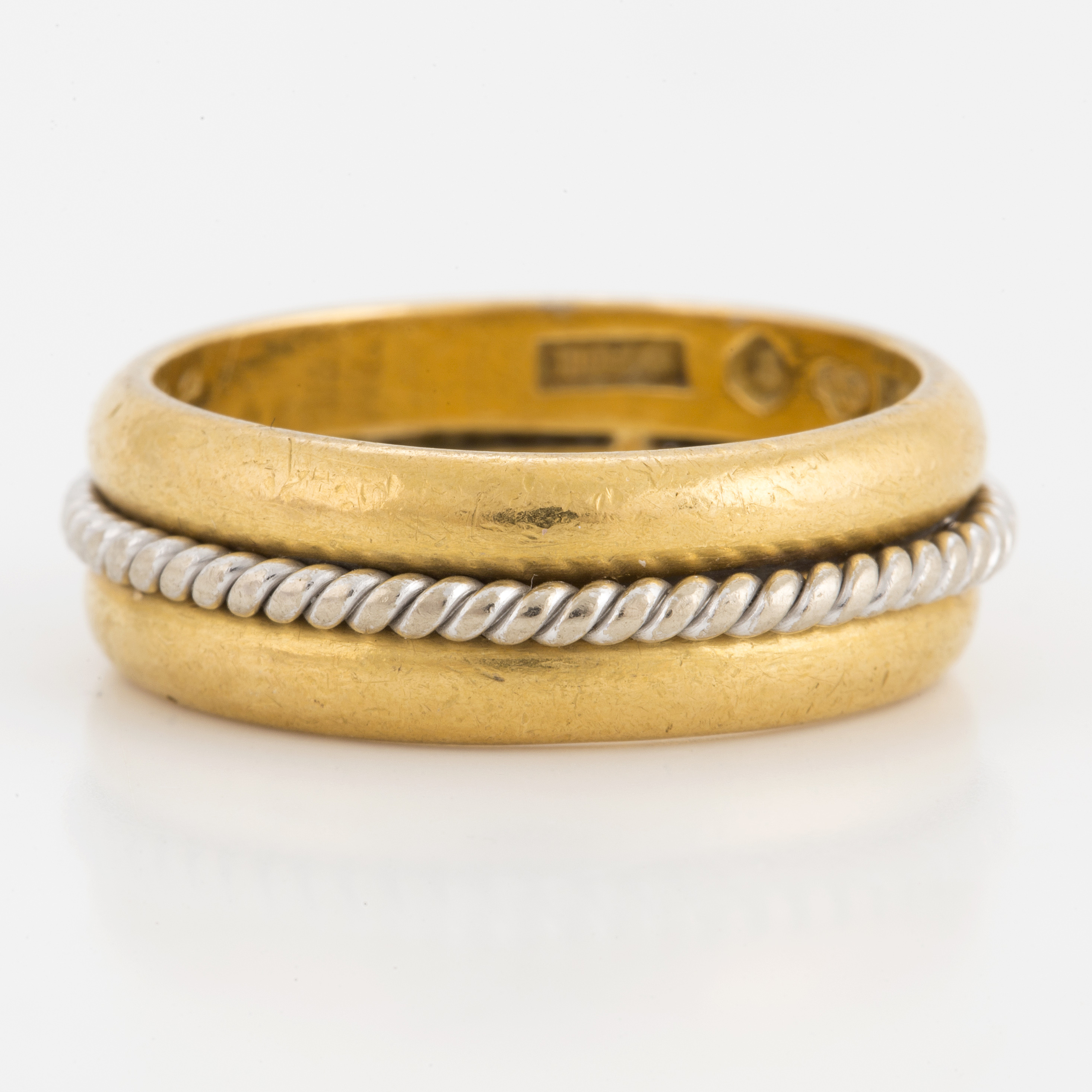 A 23K gold ring, white white gold. - Bukowskis