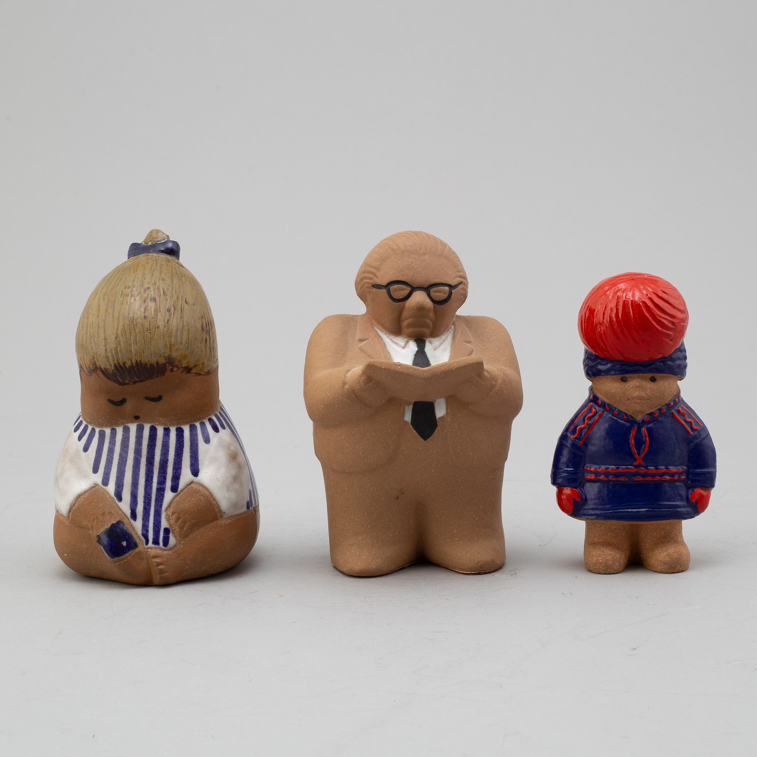 Three stoneware figurines by Lisa larsson, second half of the 20th ...