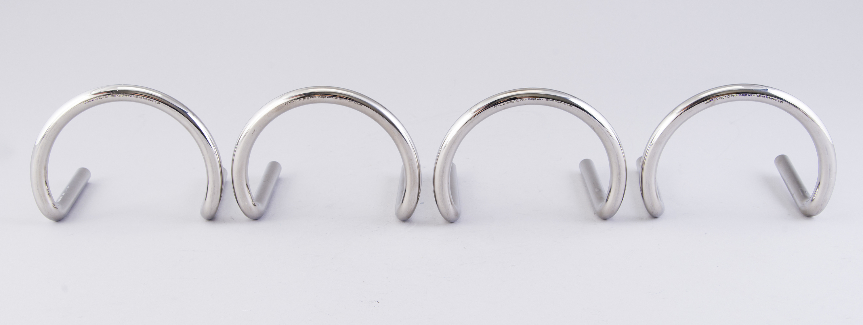 PETER KARPF, Four Danish 'Gemini' steel double candleholders for ...