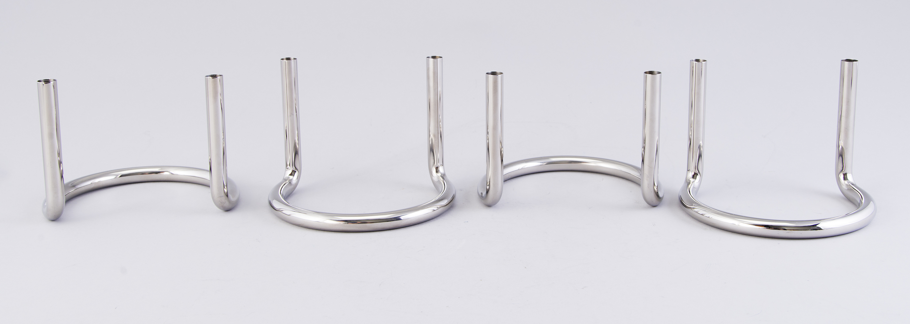 PETER KARPF, Four Danish 'Gemini' steel double candleholders for ...