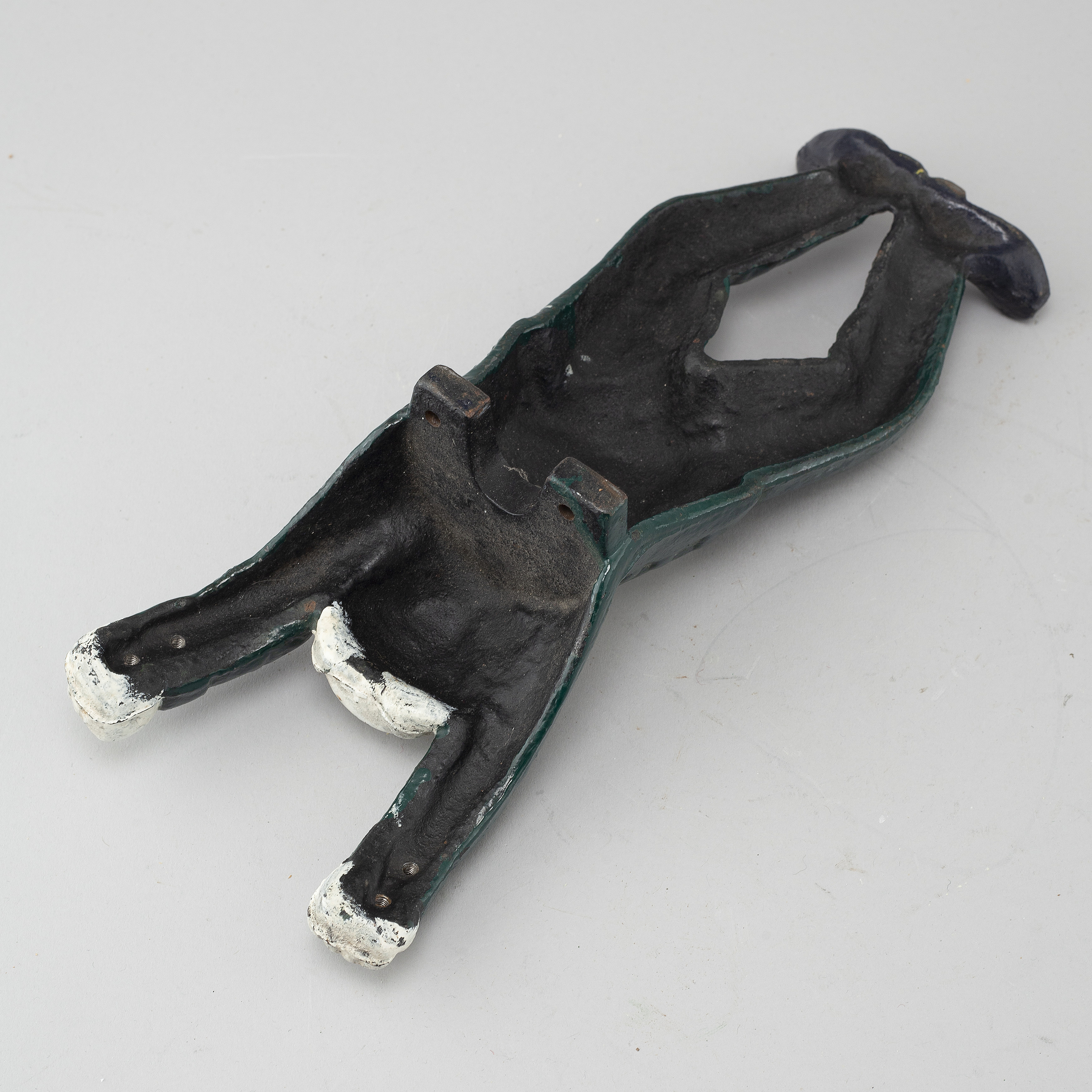 A 20th century cast iron boot jack. - Bukowskis