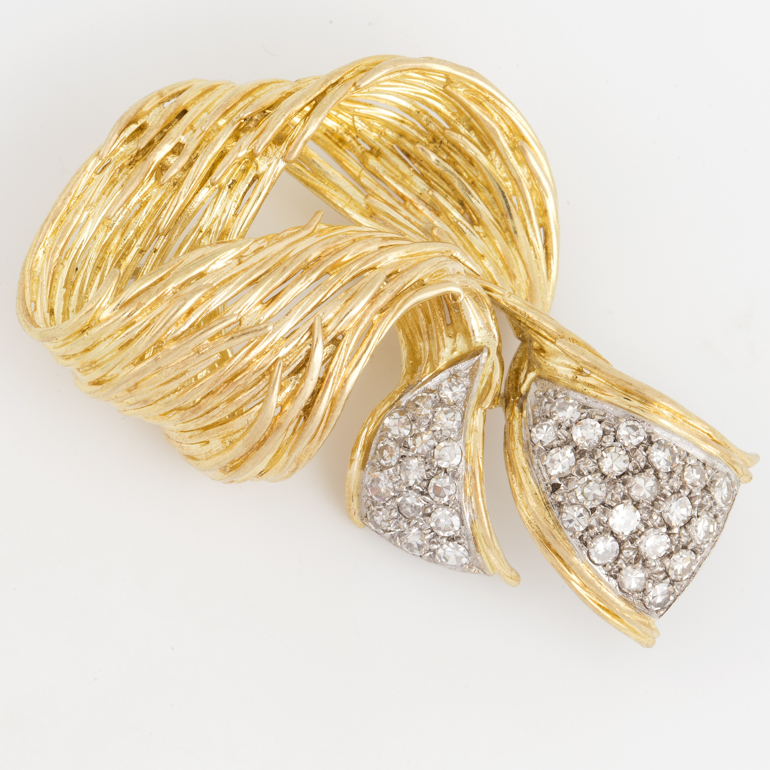 An 18K gold brooch set with eight-cut diamonds. - Bukowskis