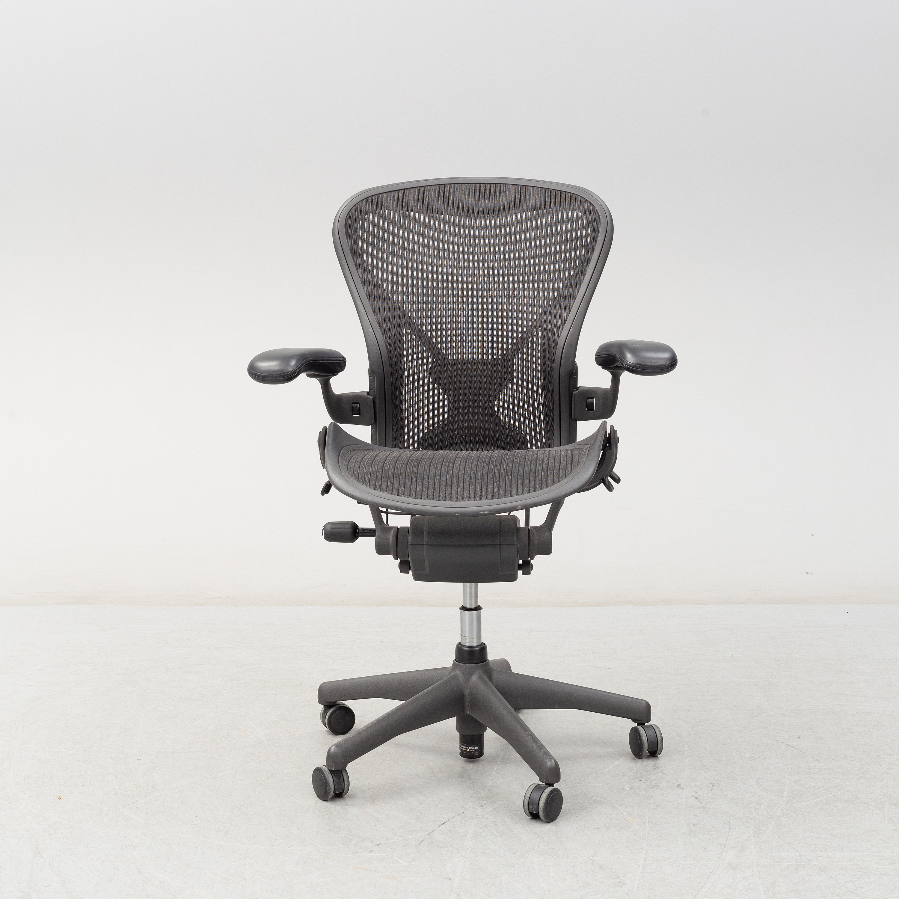 An 'Aeron' swivel armchair by Don Chadwich / Bill Stumpf, Herman Miller ...