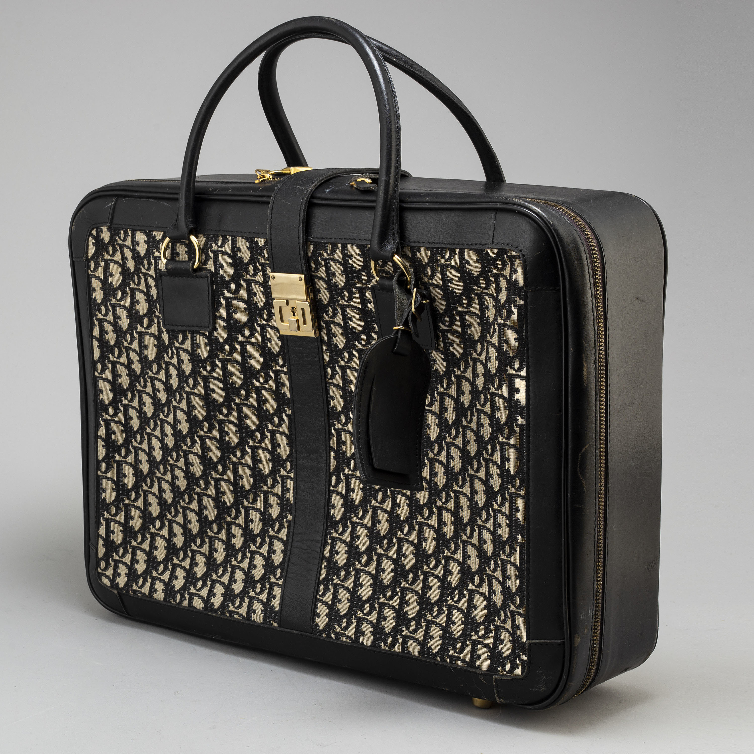 CHRISTIAN DIOR, a suitcase. - Bukowskis
