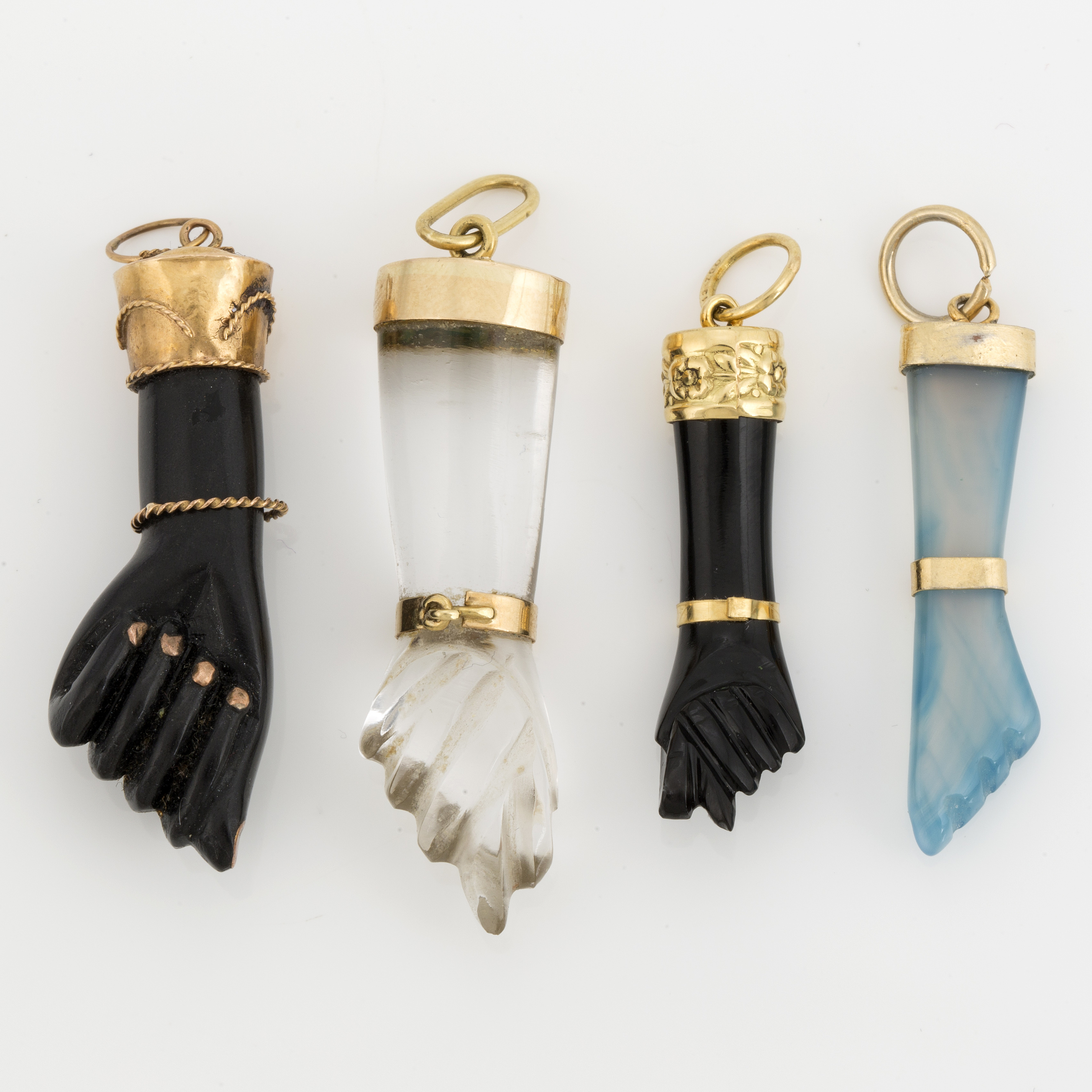 Four Mano fico pendant, including rock crystal and chalcedony. - Bukowskis