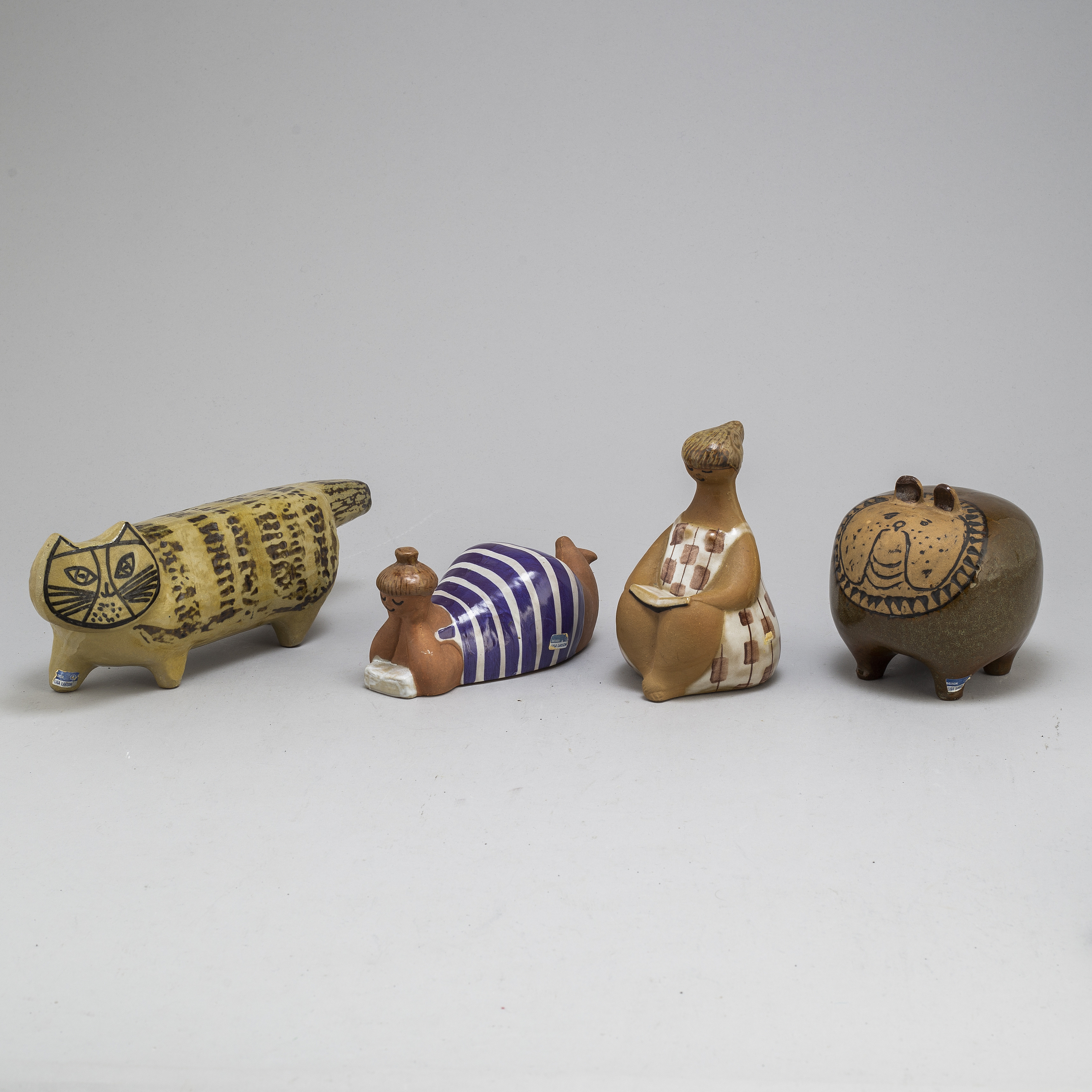 LISA LARSON, figurer, 4 st, stengods, Gustavsberg. - Bukowskis