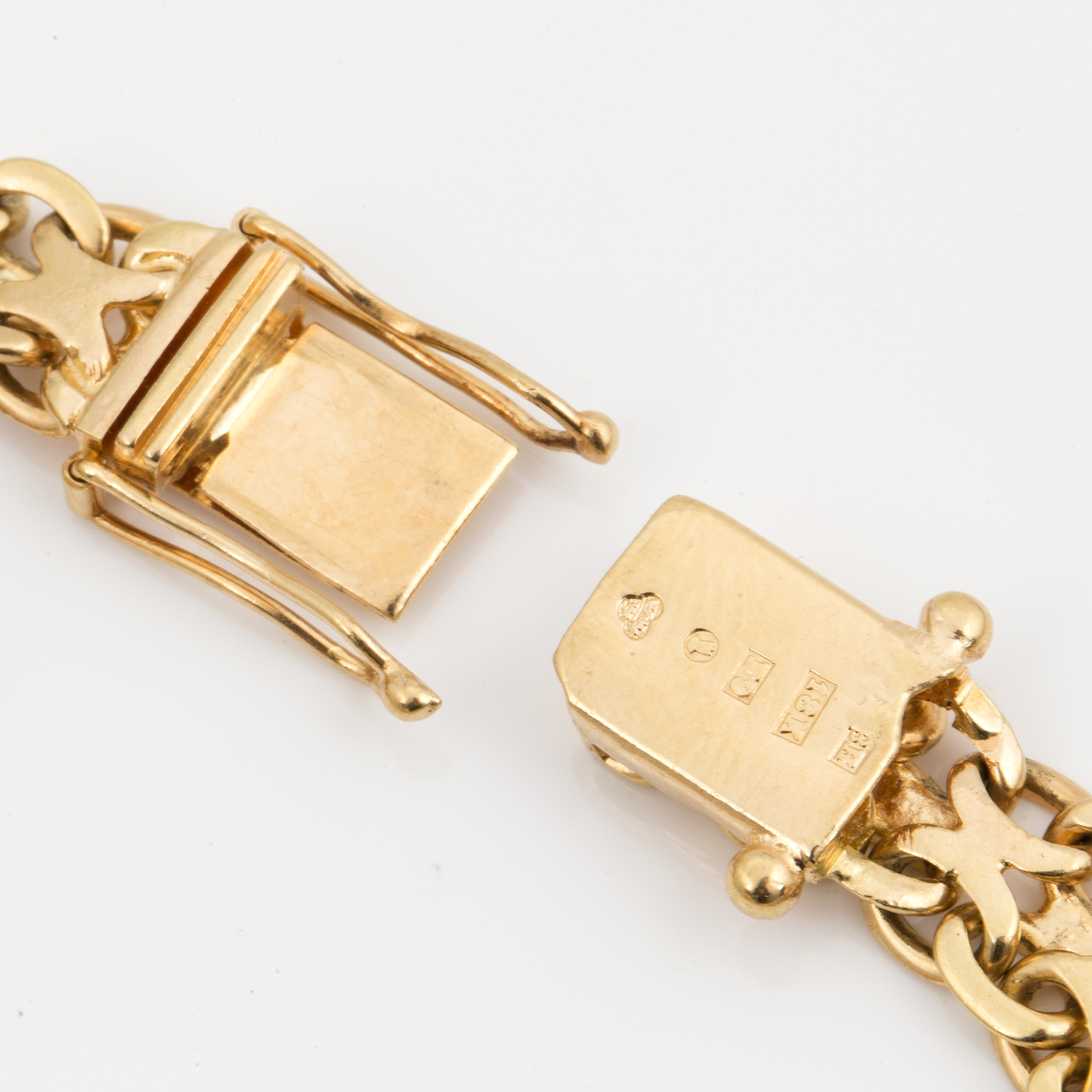 ARMBAND, 18K guld x-länk med berlocker, - Bukowskis