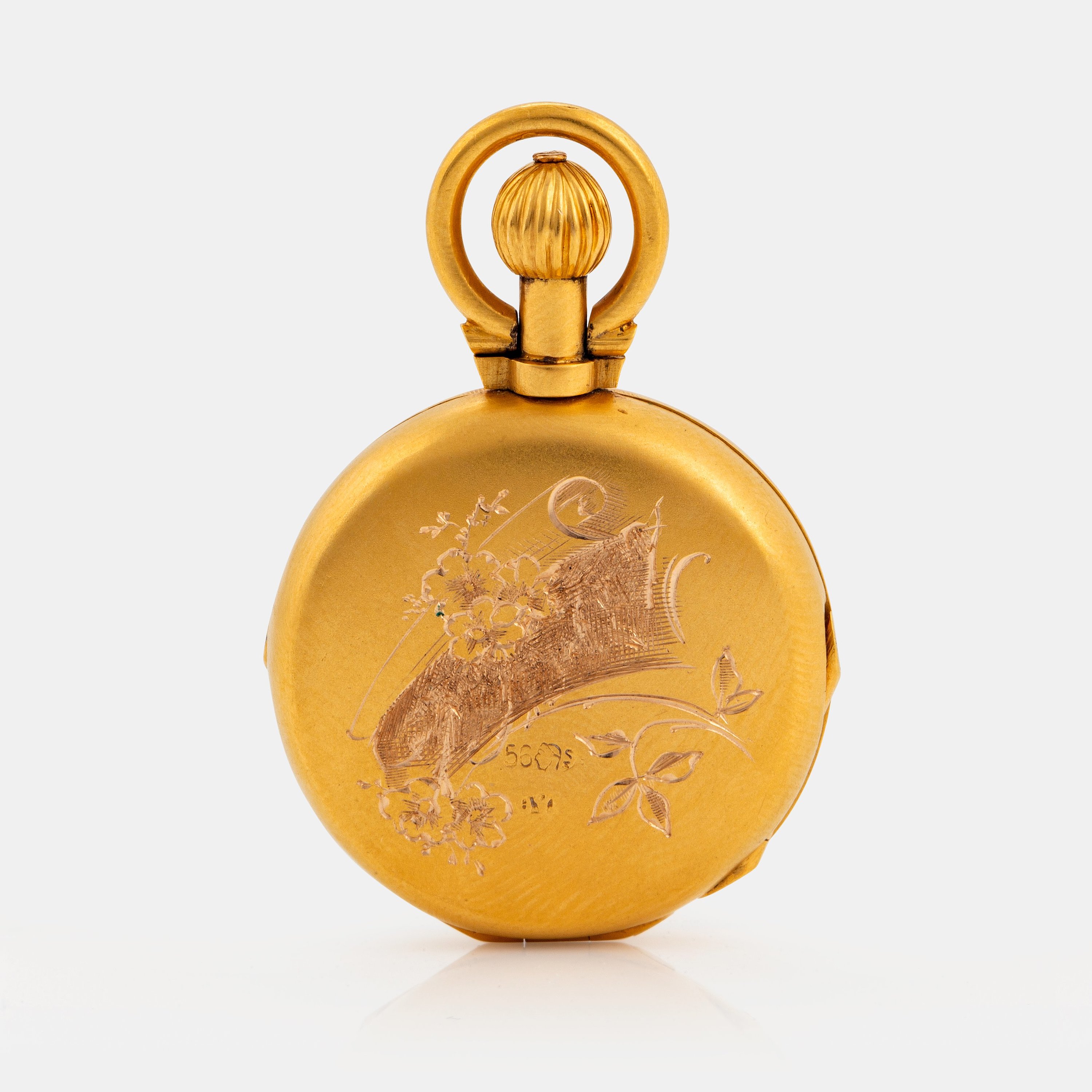 A 14K engraved gold locket. - Bukowskis