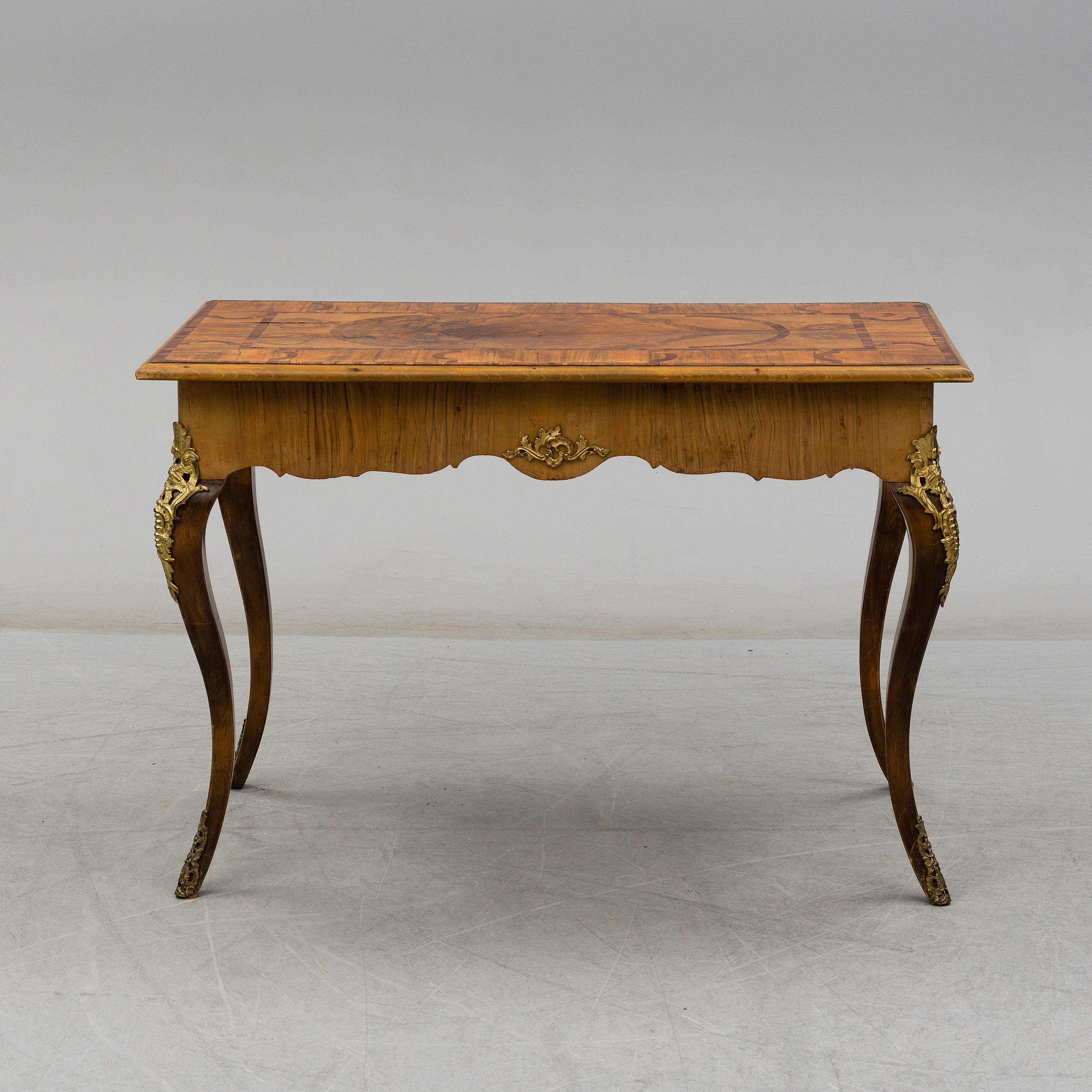 An end of the 19th Century composite rococo style table. - Bukowskis