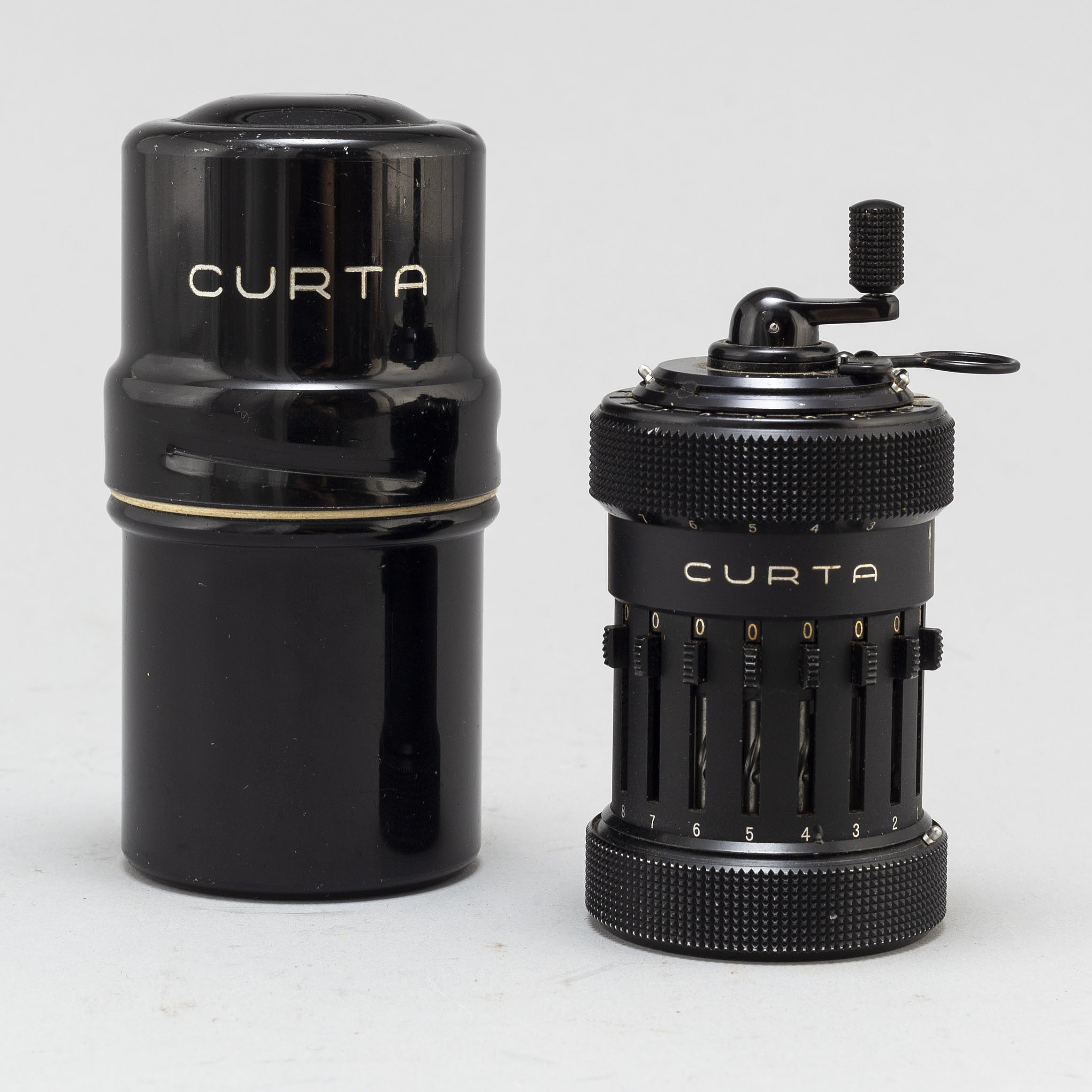 A 'Curta, Type I' calculator developed by Curt Herzstark, Contina AG ...