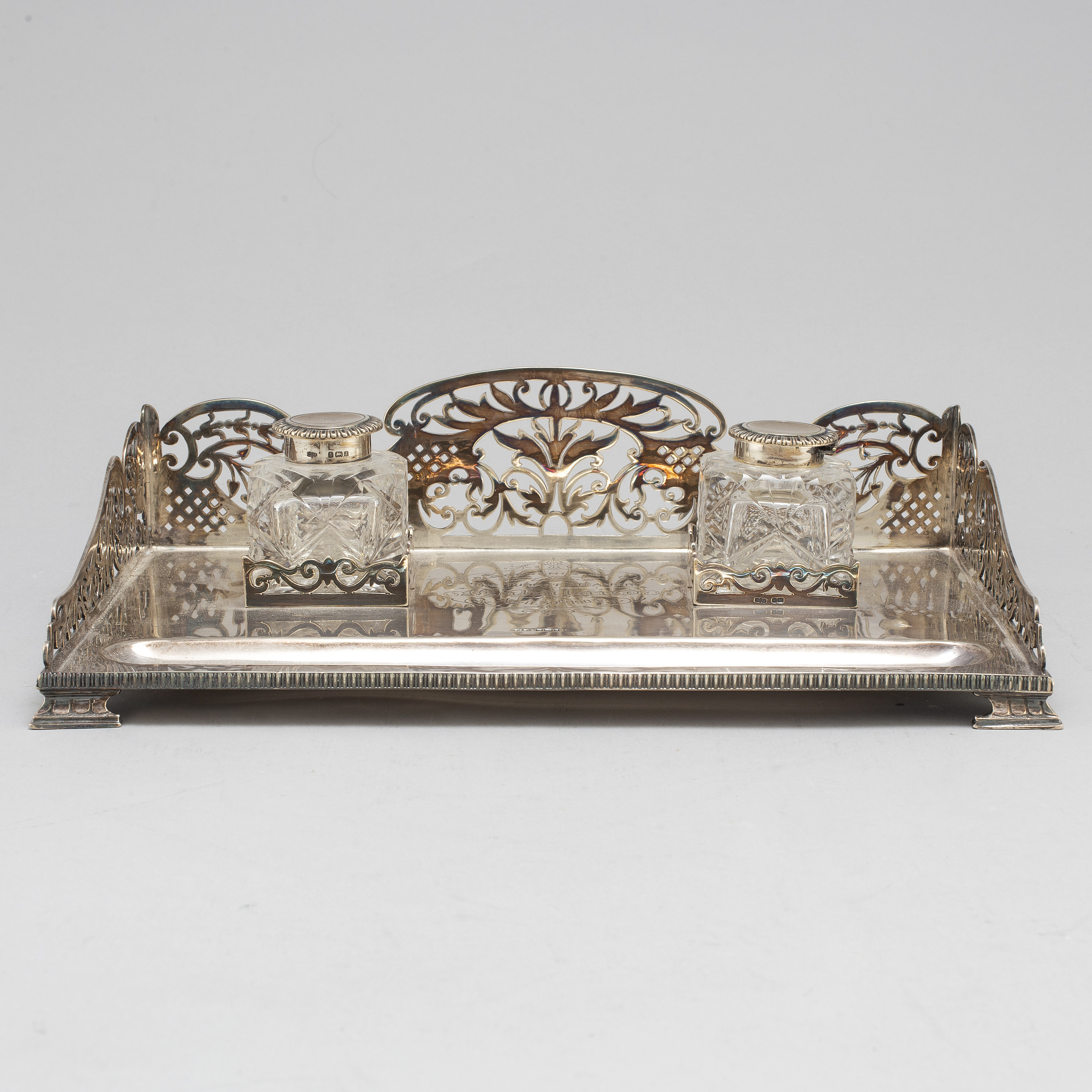 A silver plated writing set, marked JD&S, Birmingham with silver lidded ...