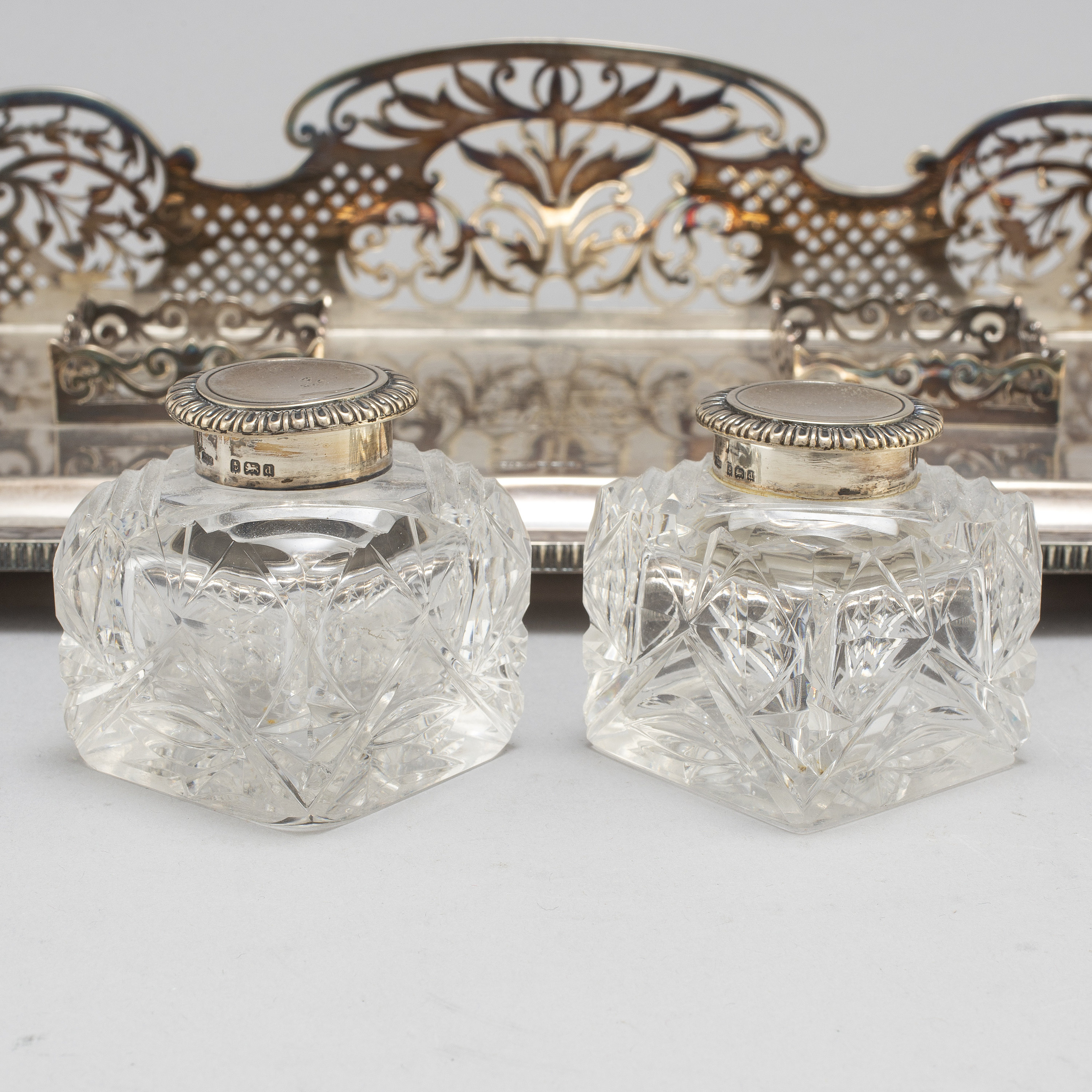 A silver plated writing set, marked JD&S, Birmingham with silver lidded ...