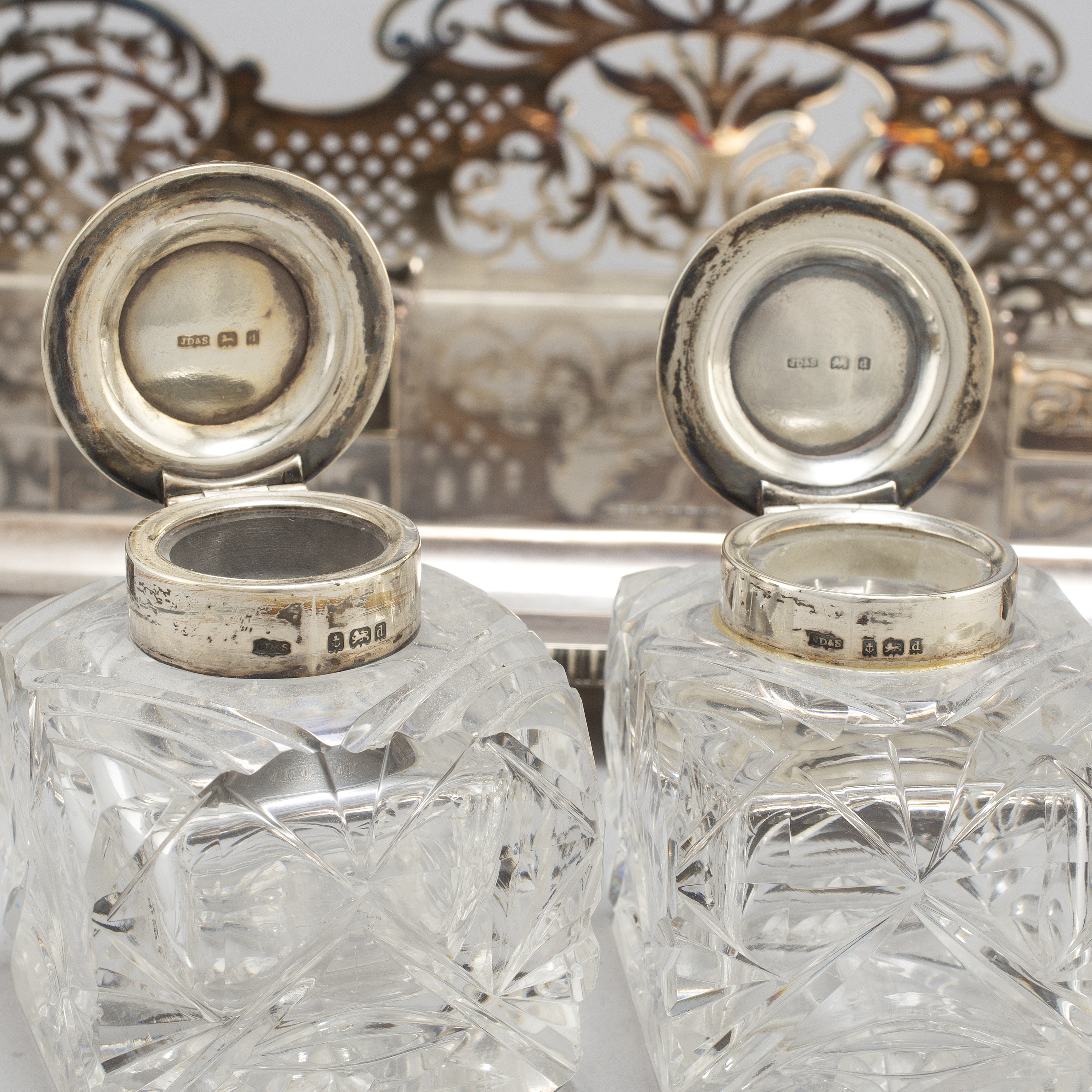 A silver plated writing set, marked JD&S, Birmingham with silver lidded ...