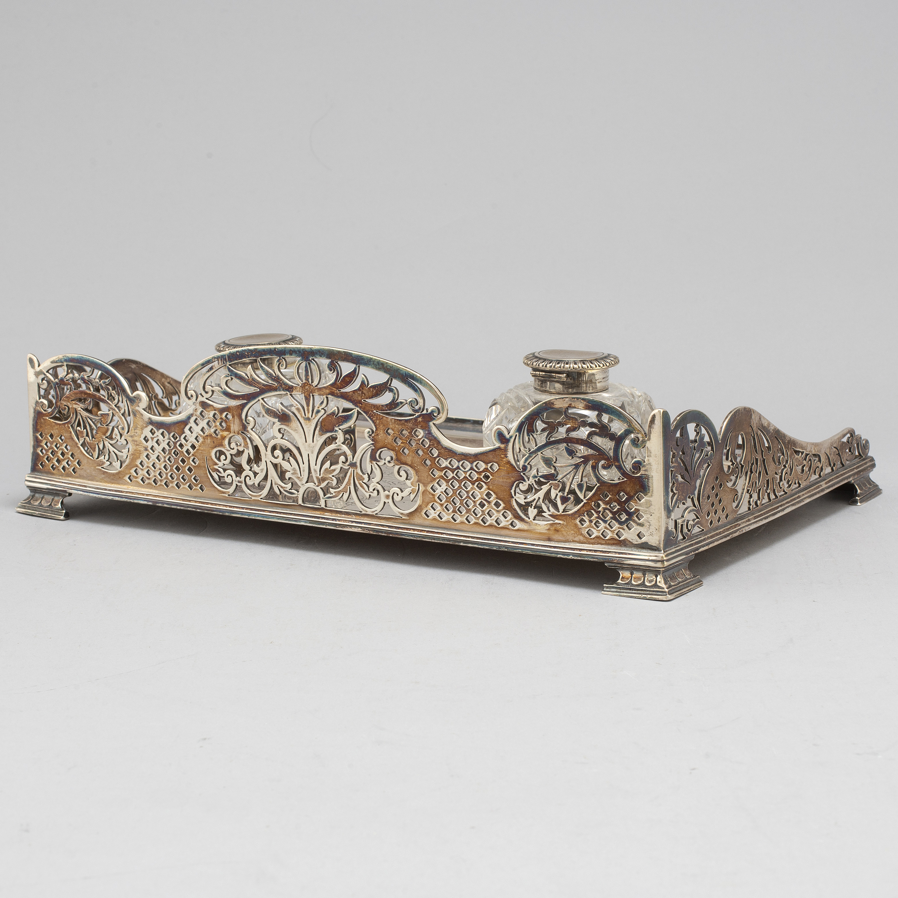 A silver plated writing set, marked JD&S, Birmingham with silver lidded ...