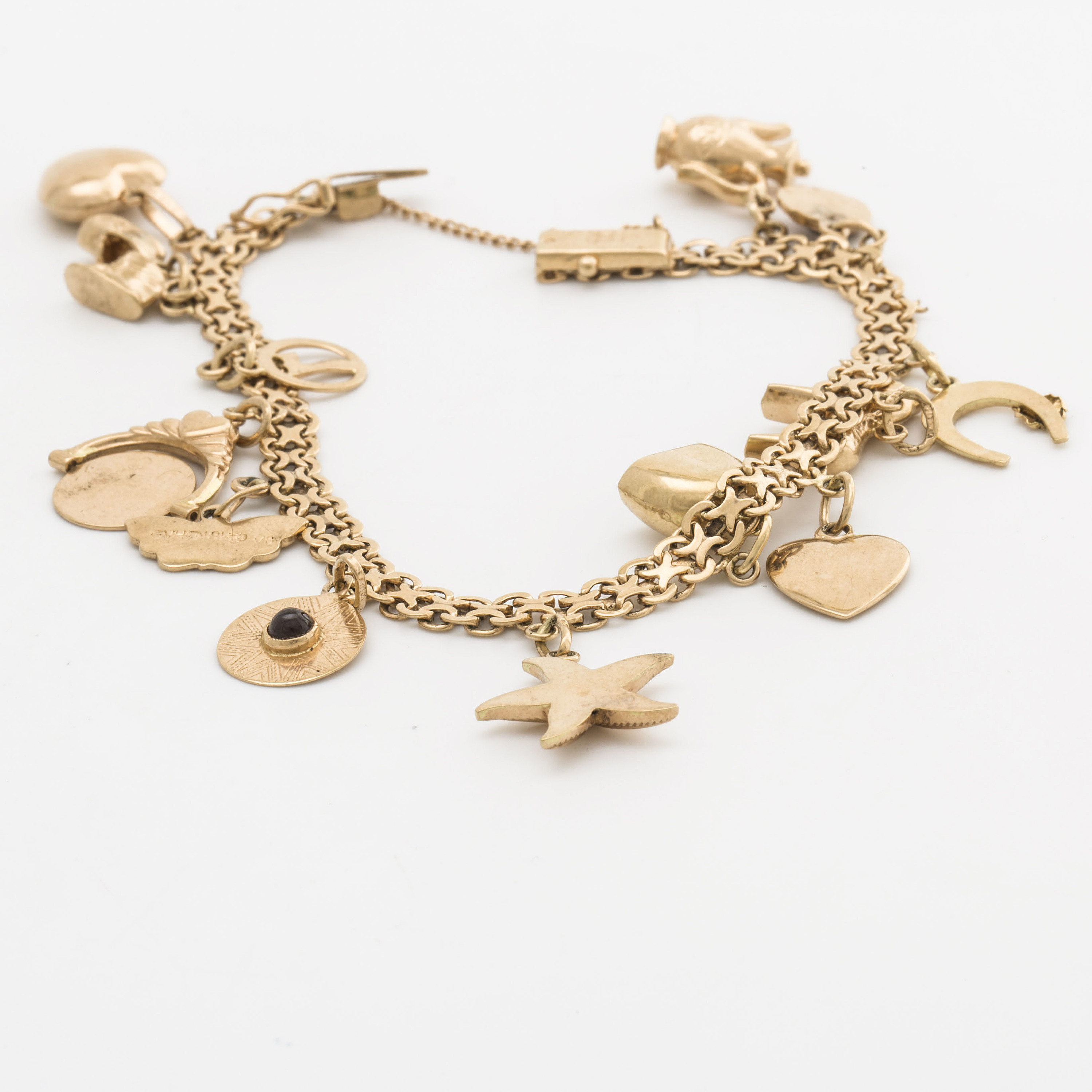 ARMBAND m BERLOCKER 18K guld, 19,0 g, Stockholm 1954. - Bukowskis