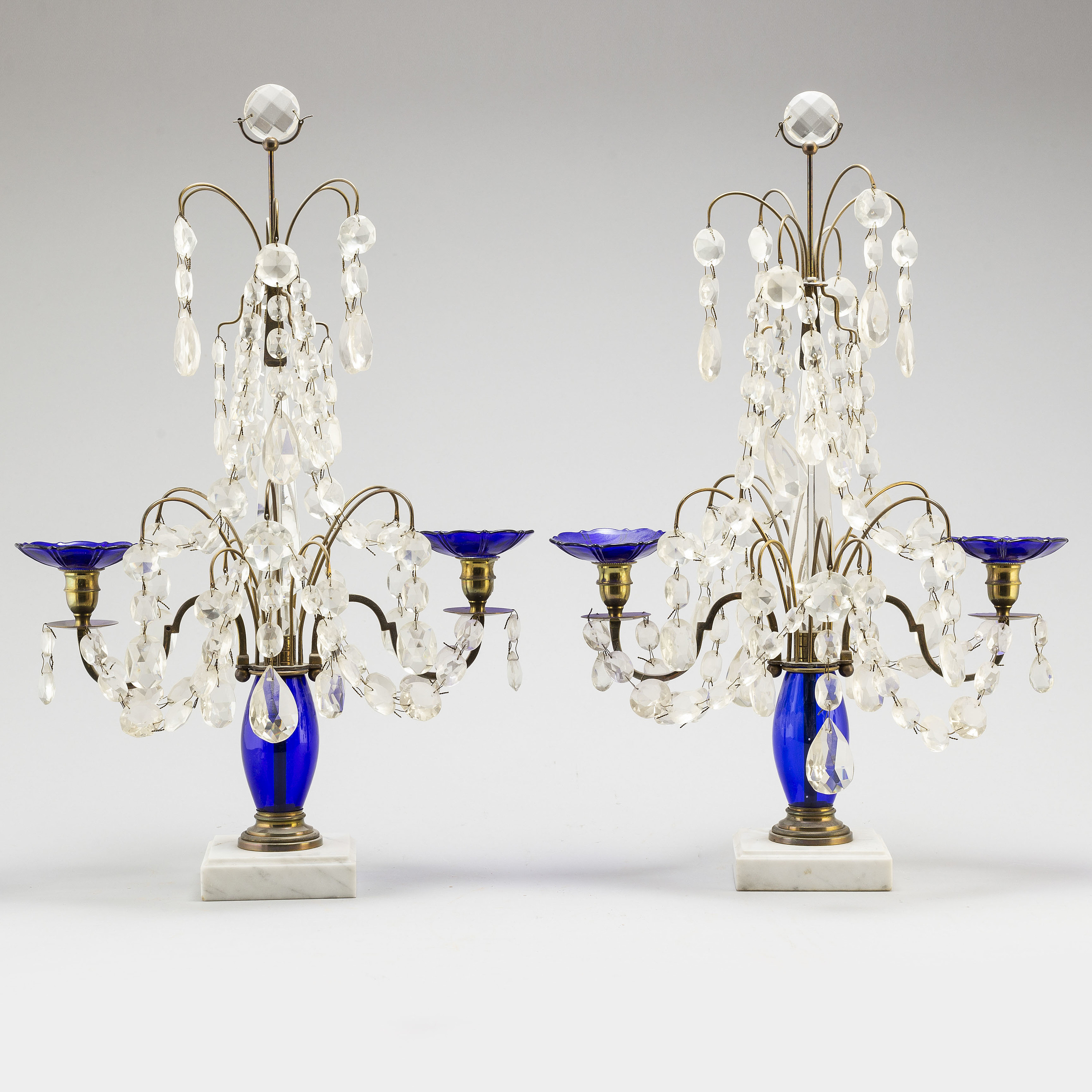 A pair of Gustavian style cut glass candlesticks, early 20th century ...