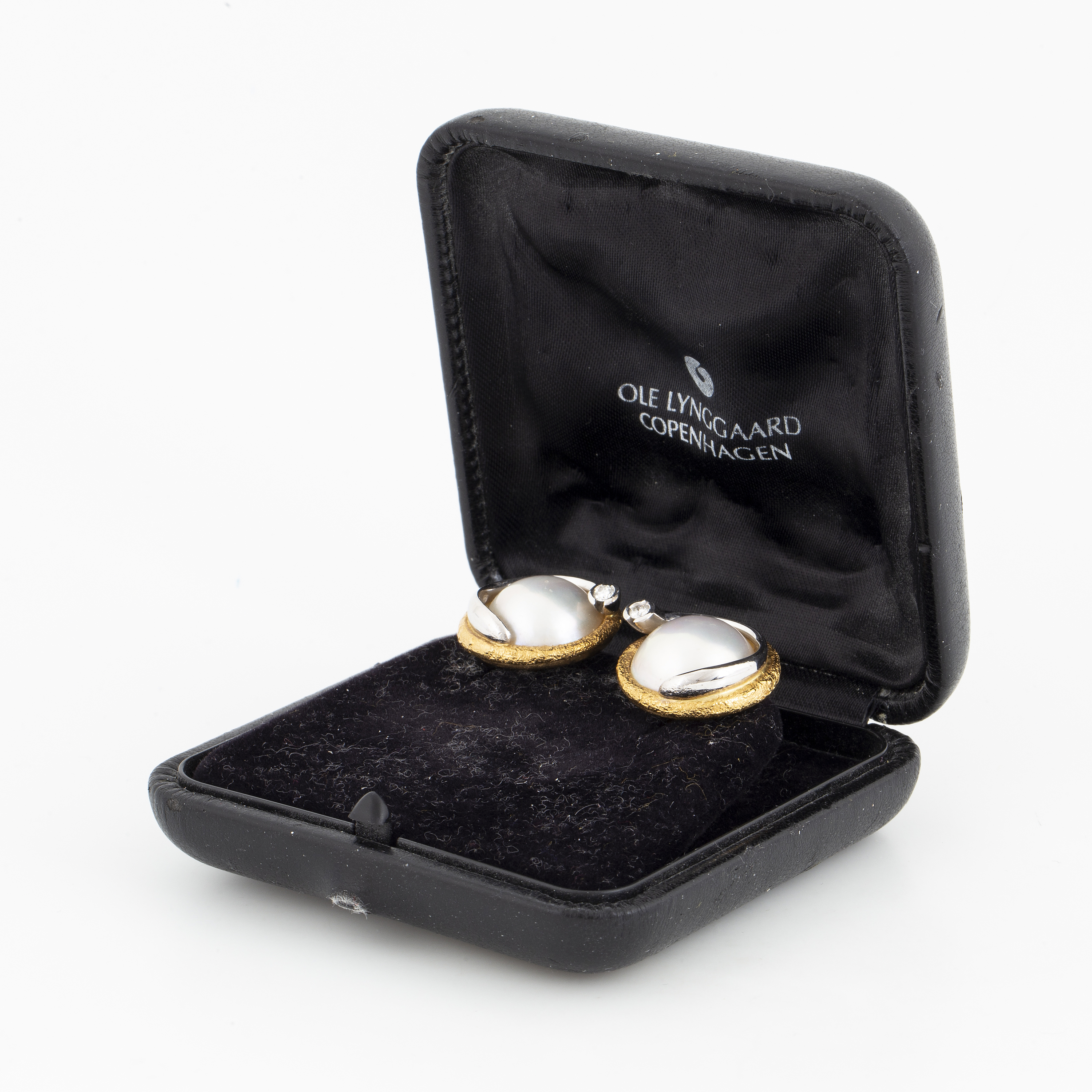 OLE LYNGGAARD, a pair of cultured pearl and brilliant cut diamond ...