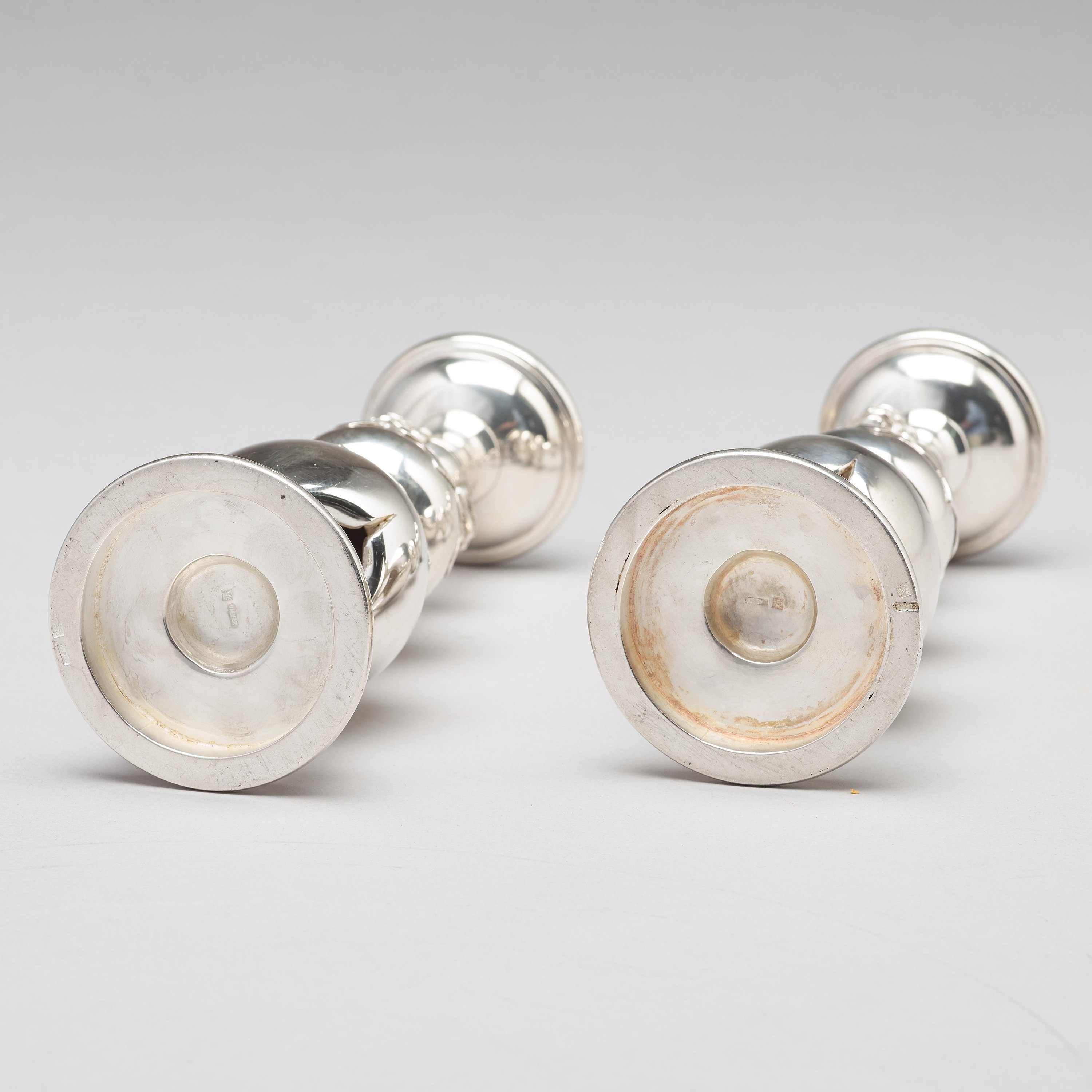 A pair of Chinese silver candle sticks, Shanghai, early 20th Century ...