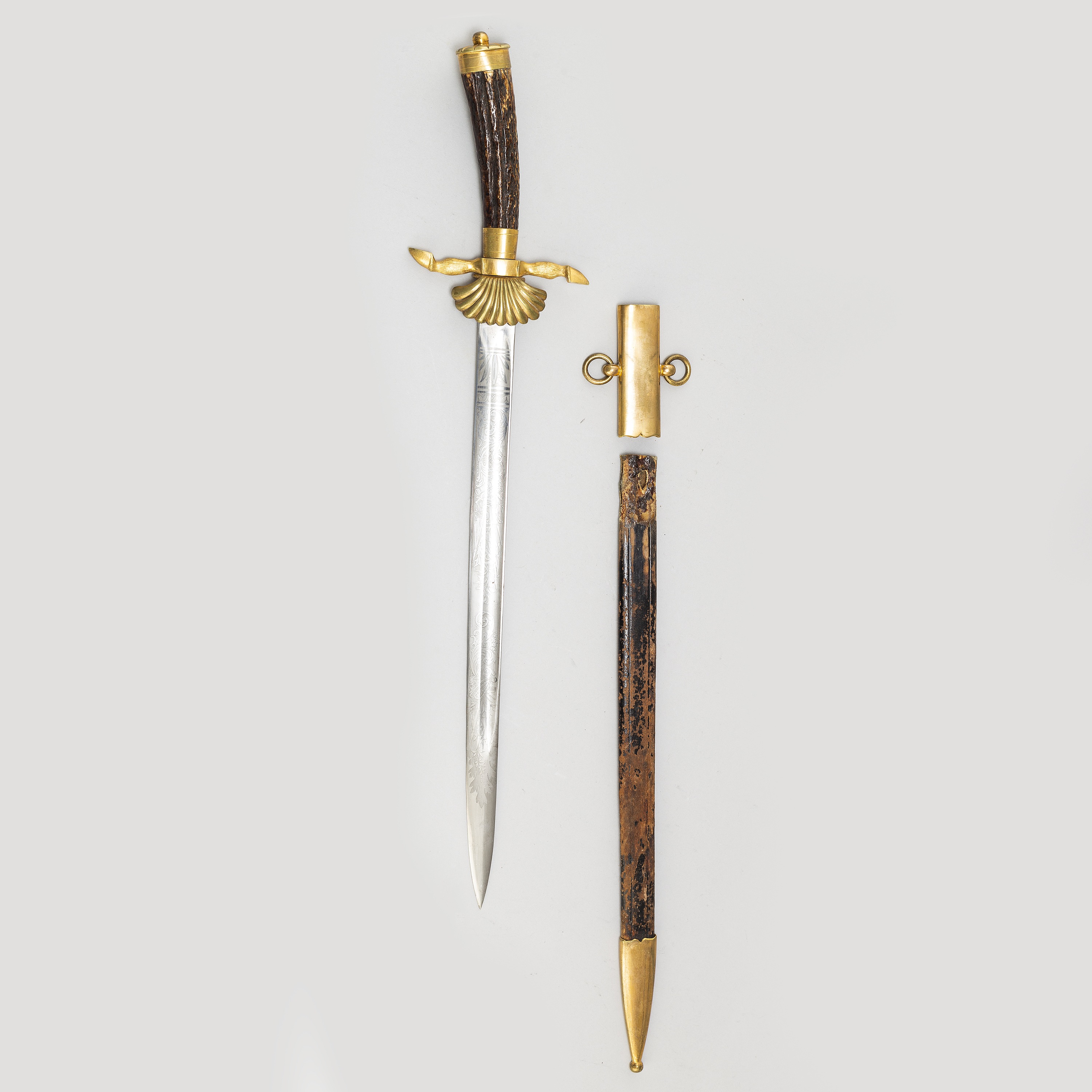An early 20th Century hunting sword with scabbard. - Bukowskis