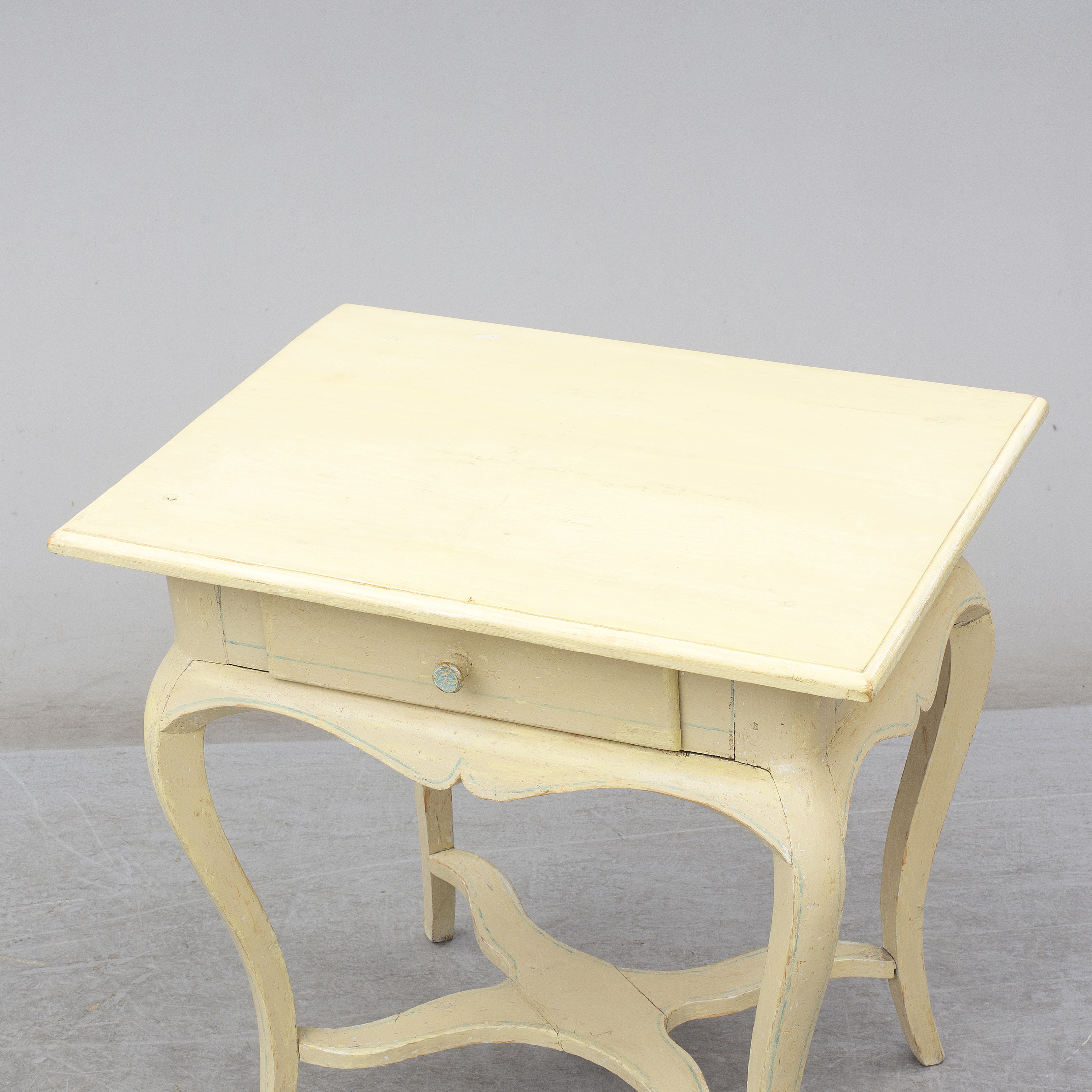 A 19th century rococo style table. - Bukowskis