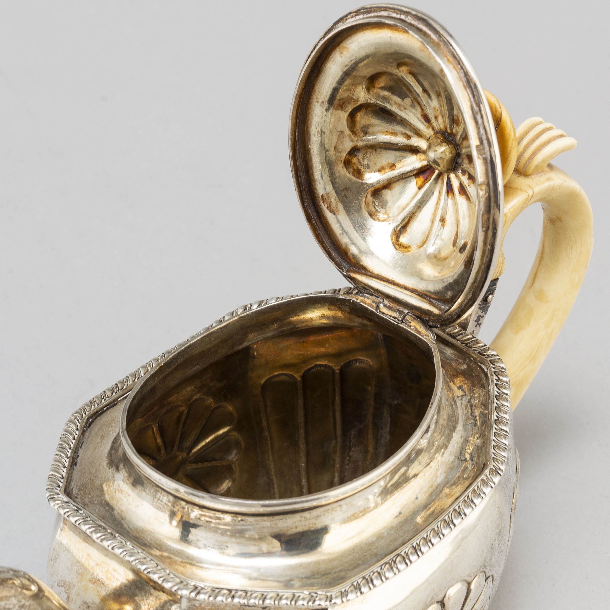 A Russian 19th century parcel-gilt silver tea-pot, St.Petersburg ...