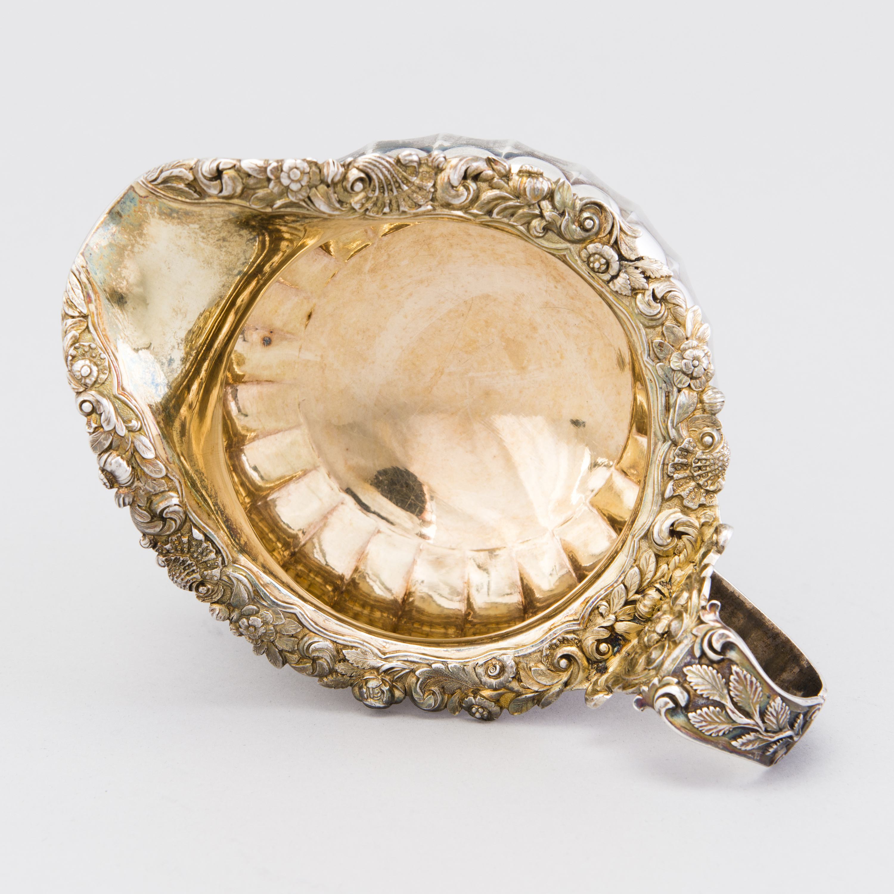 REBECCA EMES & EDWARD BARNARD I, A parcel-gilt milk jug, London 1822 ...