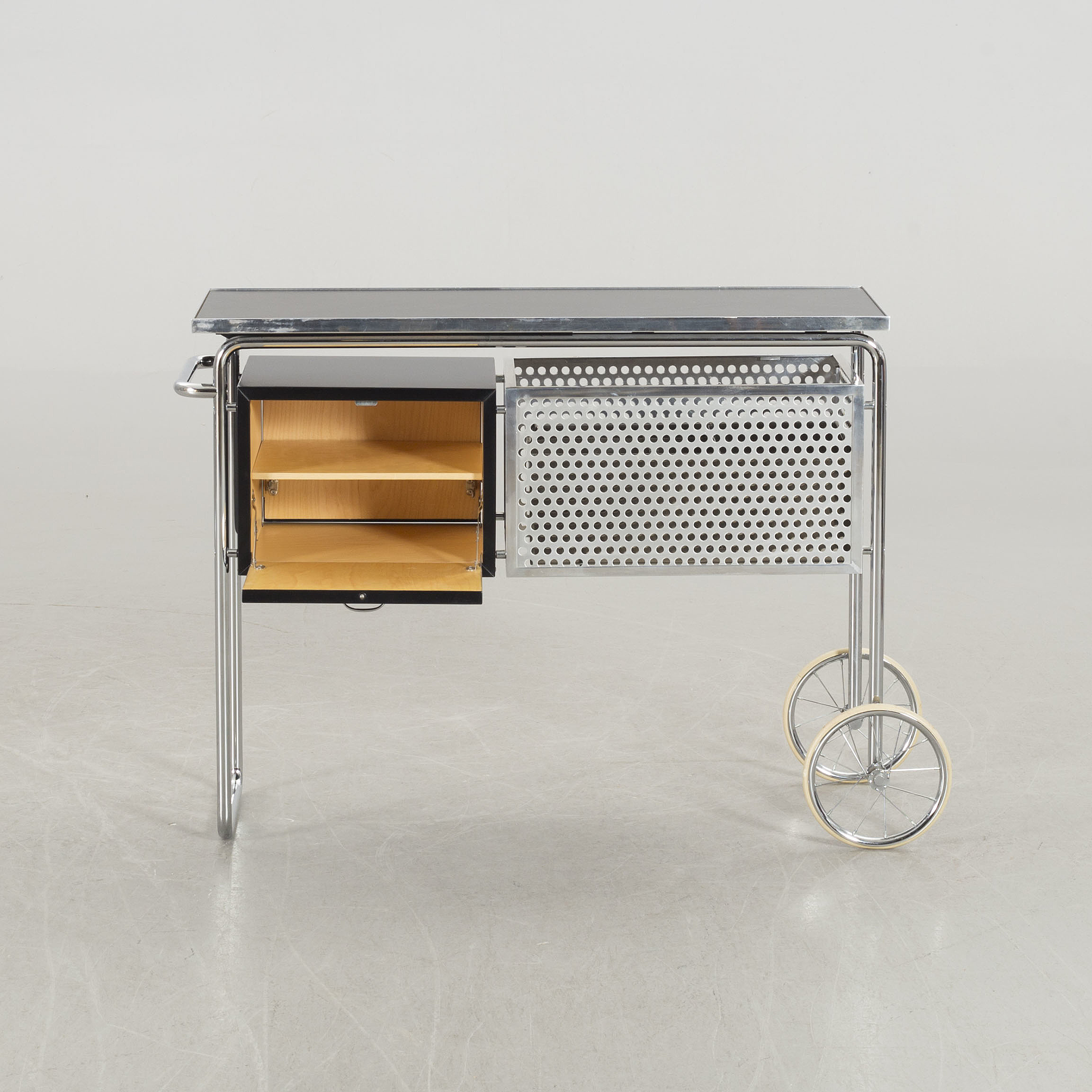A cocktail trolley, designed by Alfred Roth 1932/34. Produced c 1990 ...