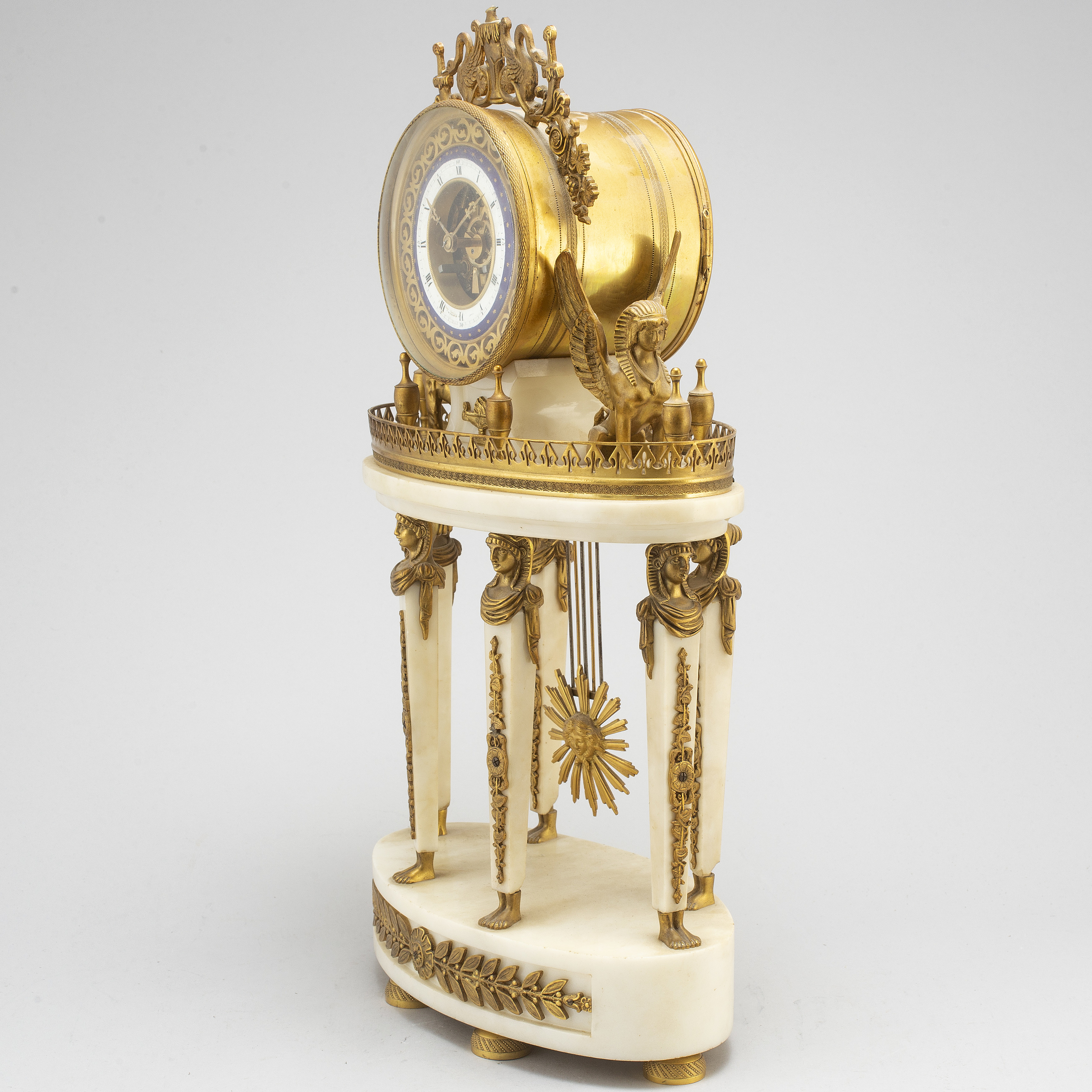 A French late 19th or early 20th century Empire style pendulum clock ...