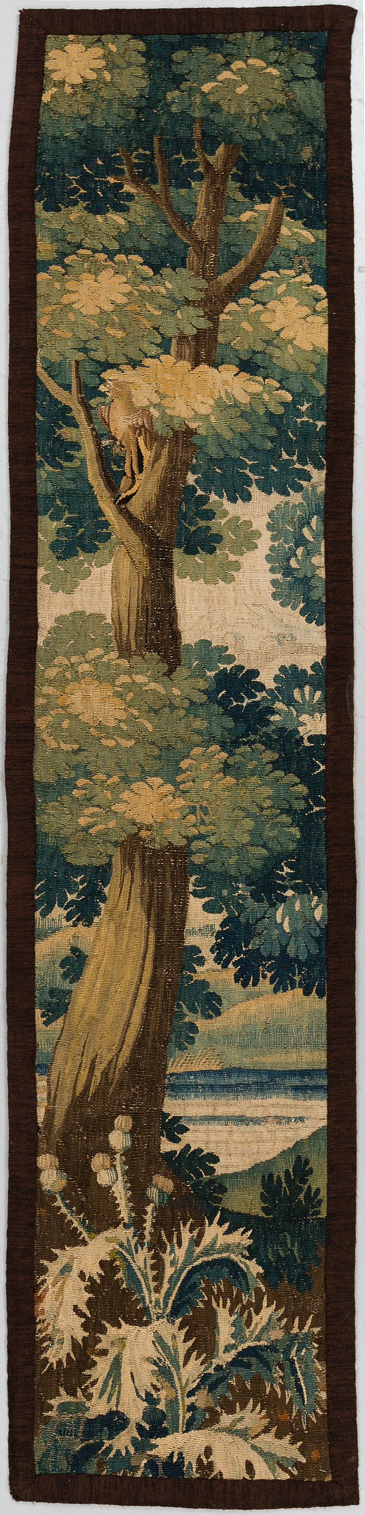 A TAPESTRY FRAGMENT, tapestry weave, ca 215,5 x 48 cm, Flanders around ...