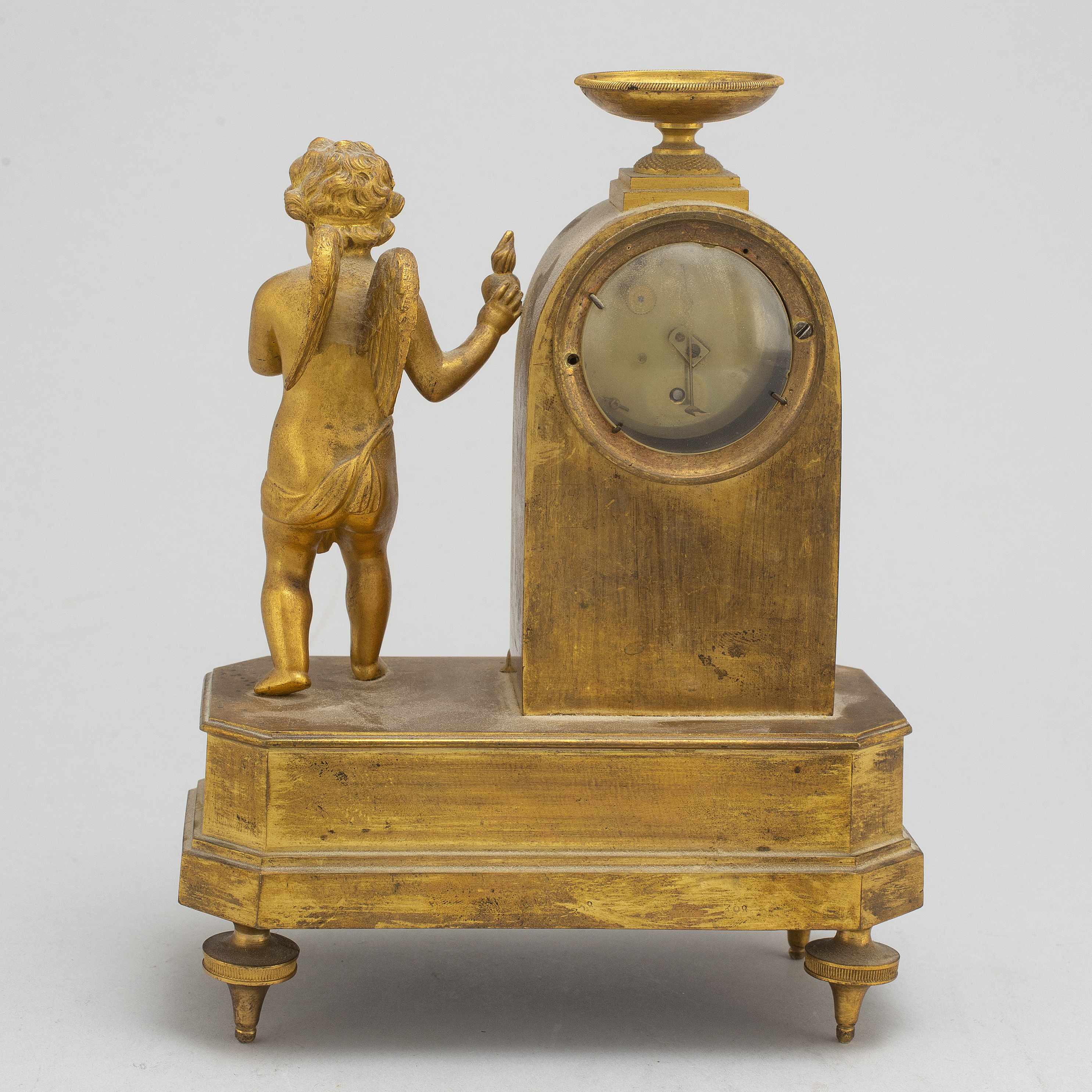 A German Empire mantel clock, early 19th century. - Bukowskis