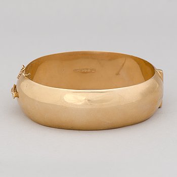 ARMRING, 14K guld. Westerback, Helsingfors 1968. - Bukowskis