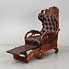 A mid 19th century Central European reading chair. - Bukowskis