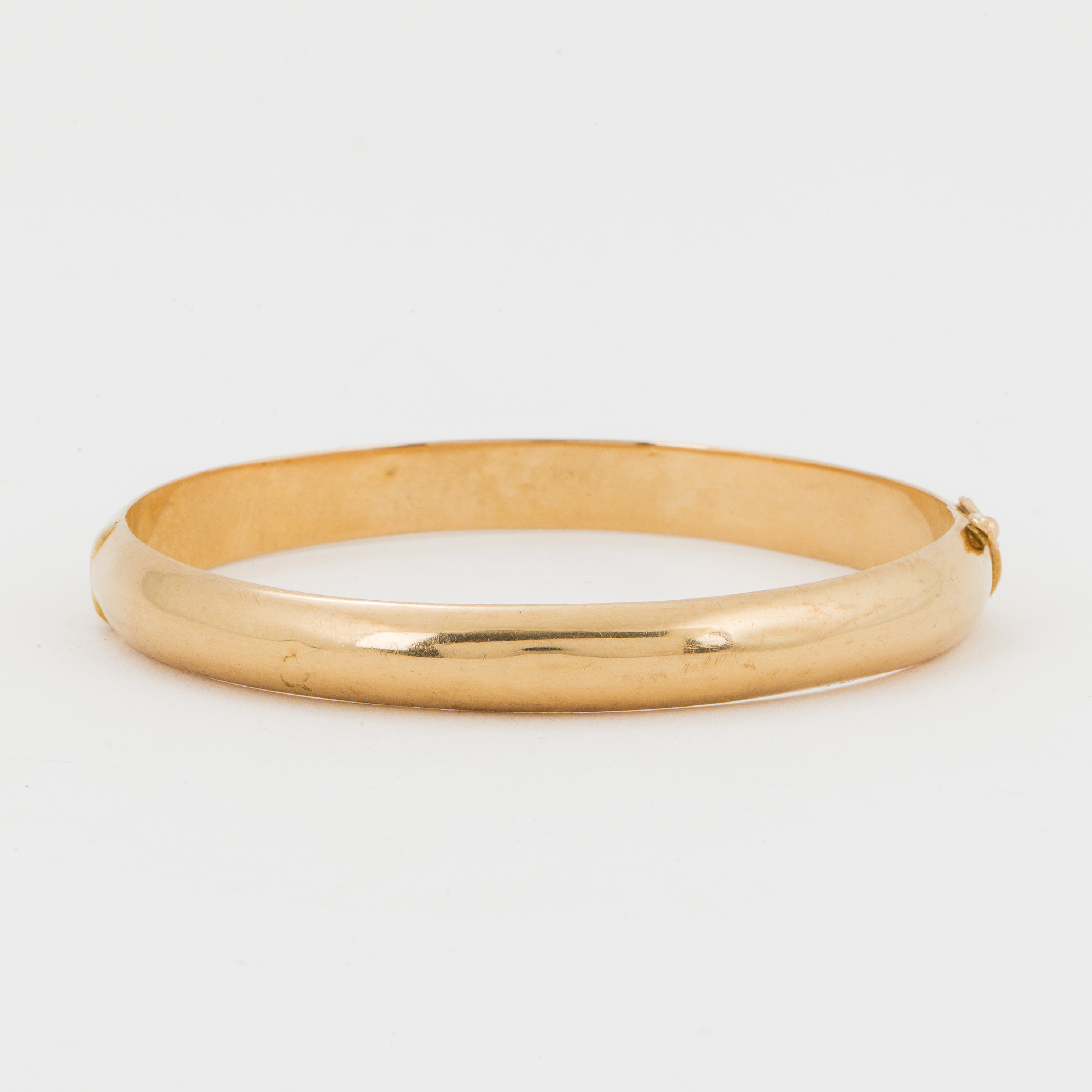 18K gold bangle. - Bukowskis