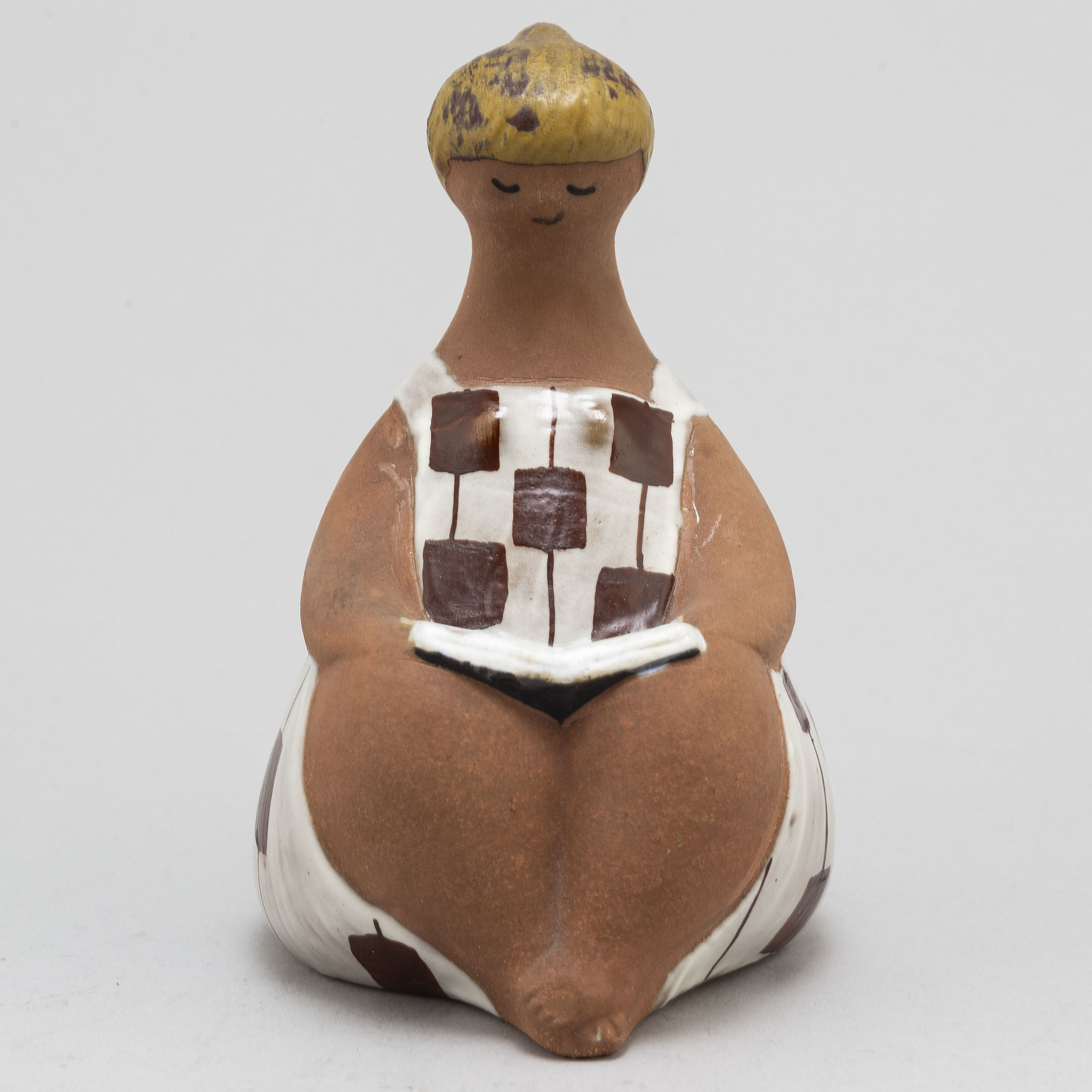 LISA LARSON, a 'Charlotta' stoneware figurine, from ABC-Flickorna, Gustavsberg. - Bukowskis