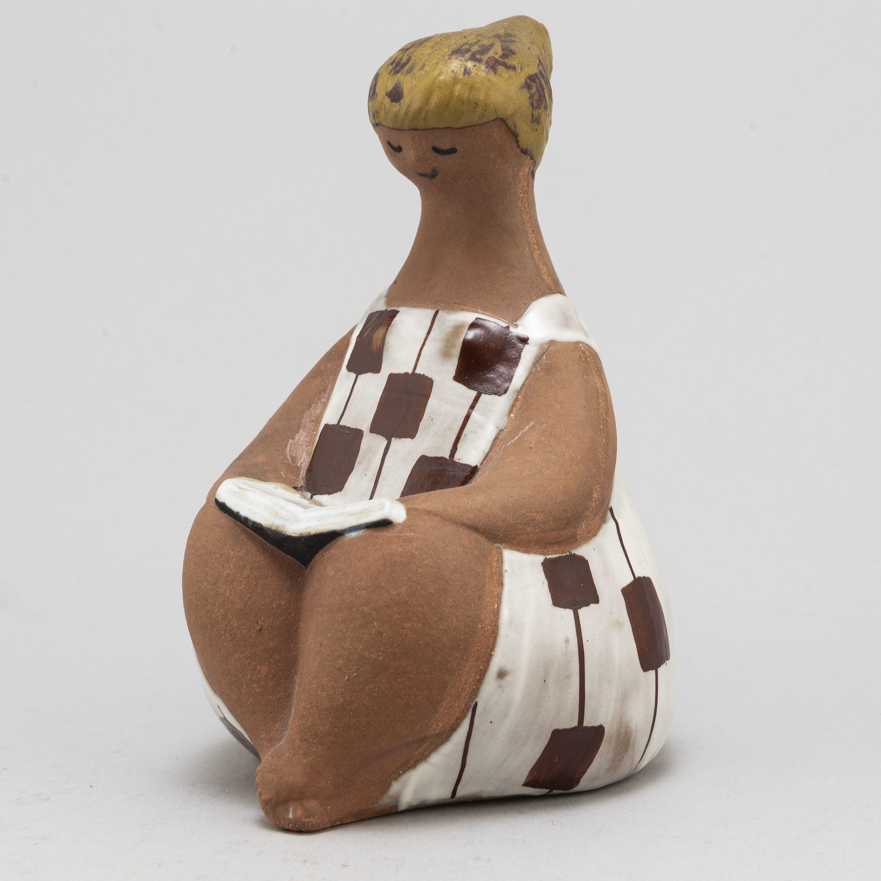 LISA LARSON, a 'Charlotta' stoneware figurine, from ABC-Flickorna, Gustavsberg. - Bukowskis