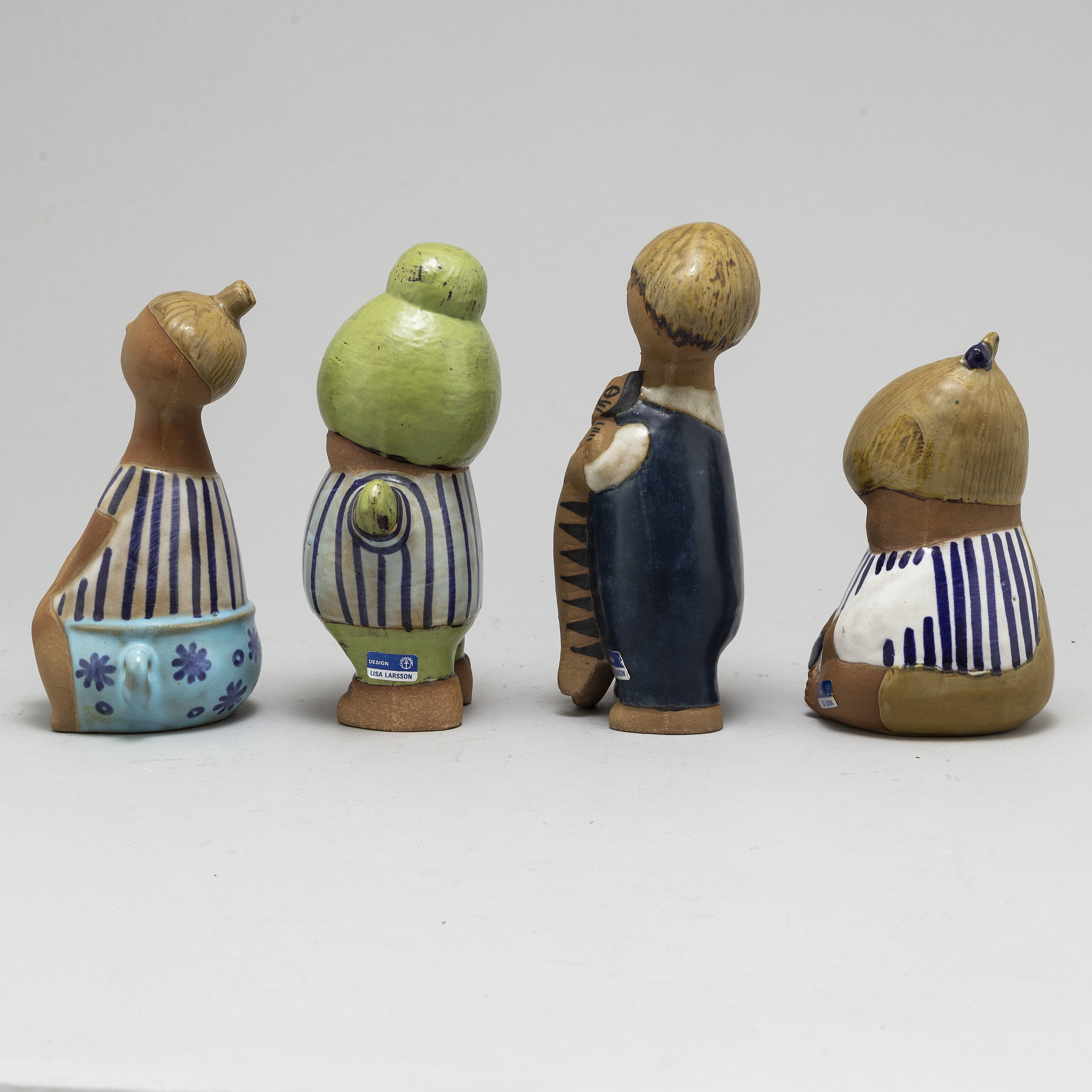LISA LARSON, 4 stoneware figurines from the series "Larssons ungar" for Gustavsberg. - Bukowskis