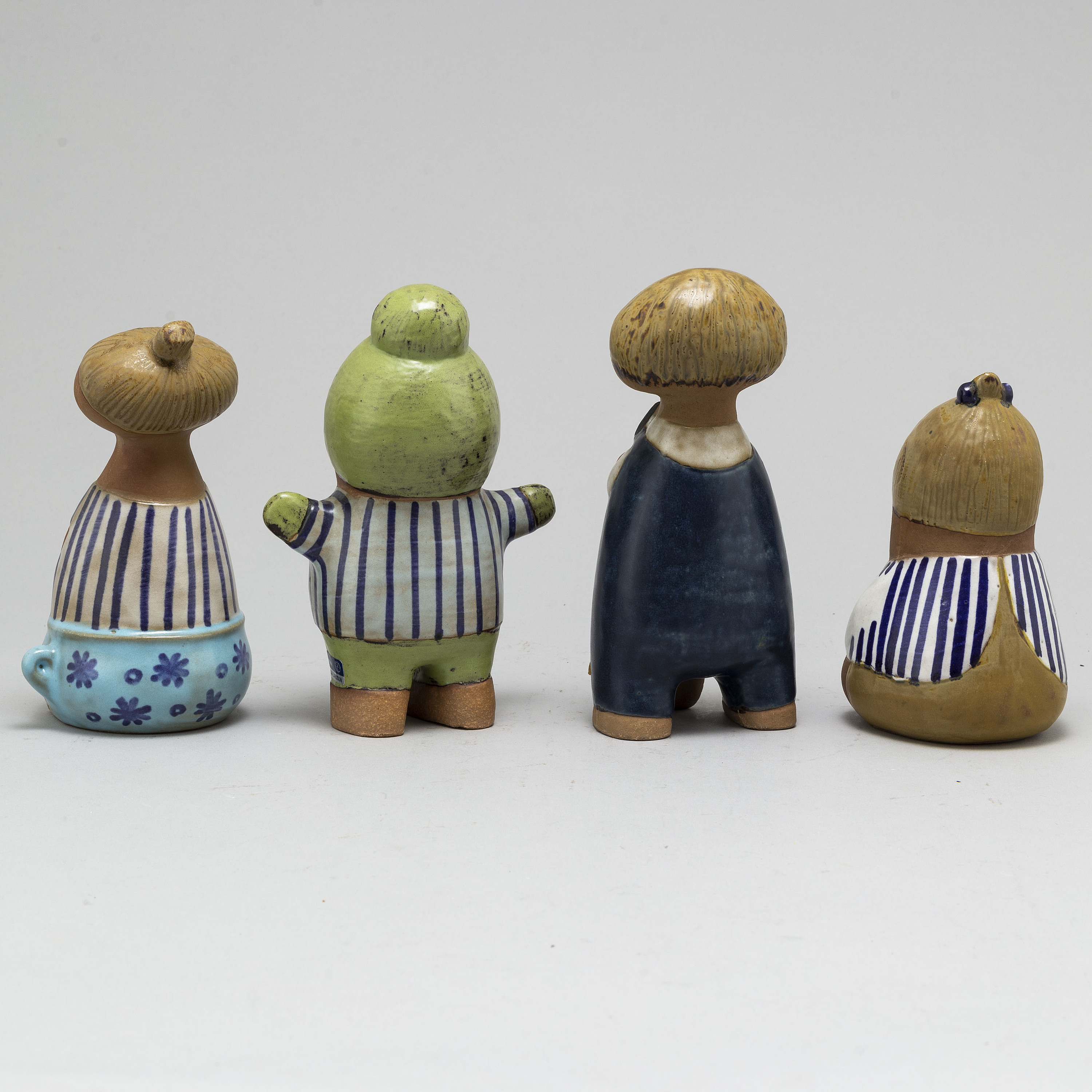 LISA LARSON, 4 stoneware figurines from the series "Larssons ungar" for Gustavsberg. - Bukowskis