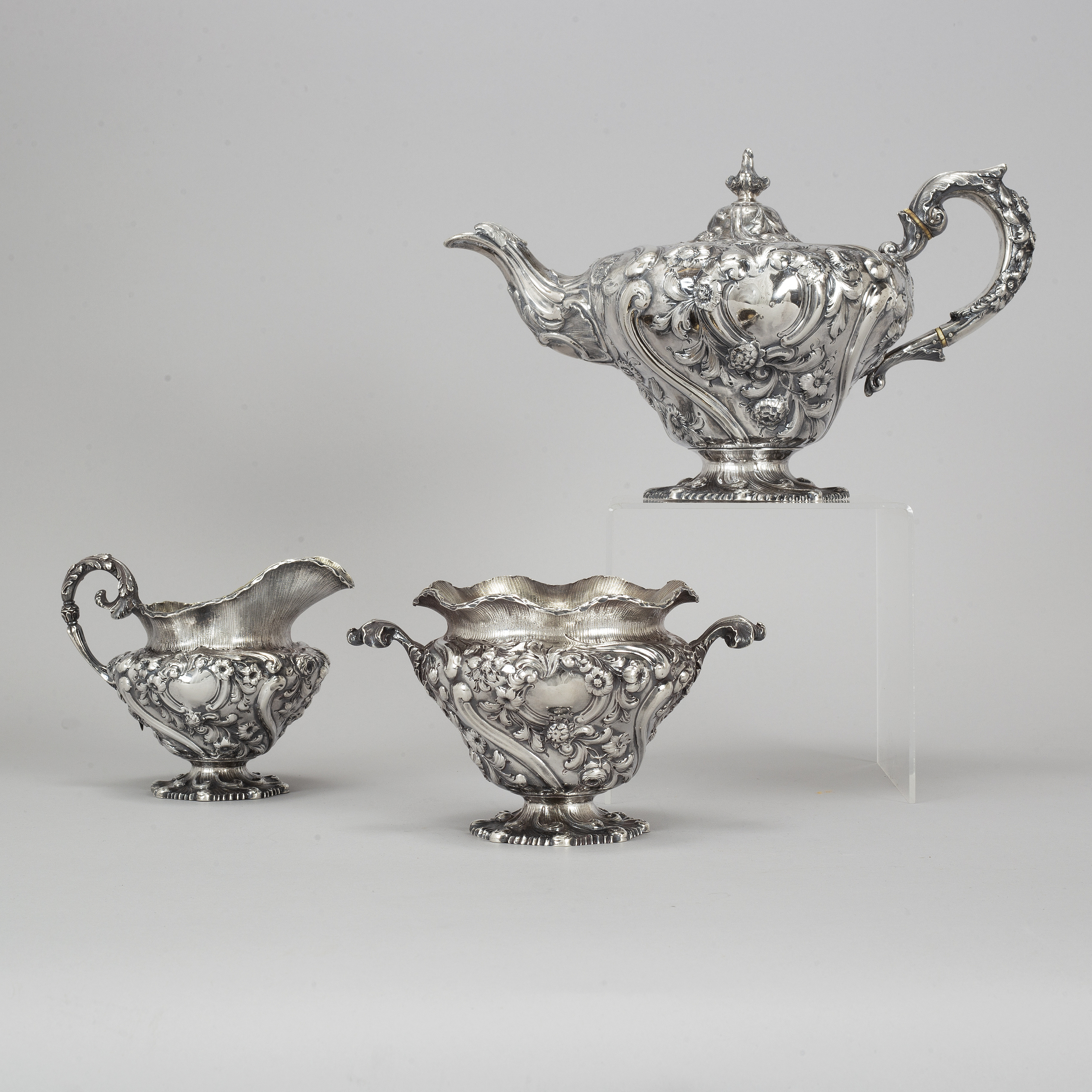 A silver tea pot, sugar bowl and creamer, Charles Fox II, London 1832 ...