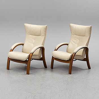 A pair of easy chairs, Conform, 21st century. - Bukowskis