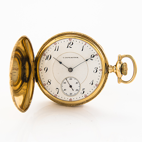 A 14K gold C.D. Peacock Keystone pocket watch with a diamond ca 0.11 ct ...