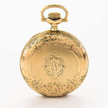A 14K gold C.D. Peacock Keystone pocket watch with a diamond ca 0.11 ct ...
