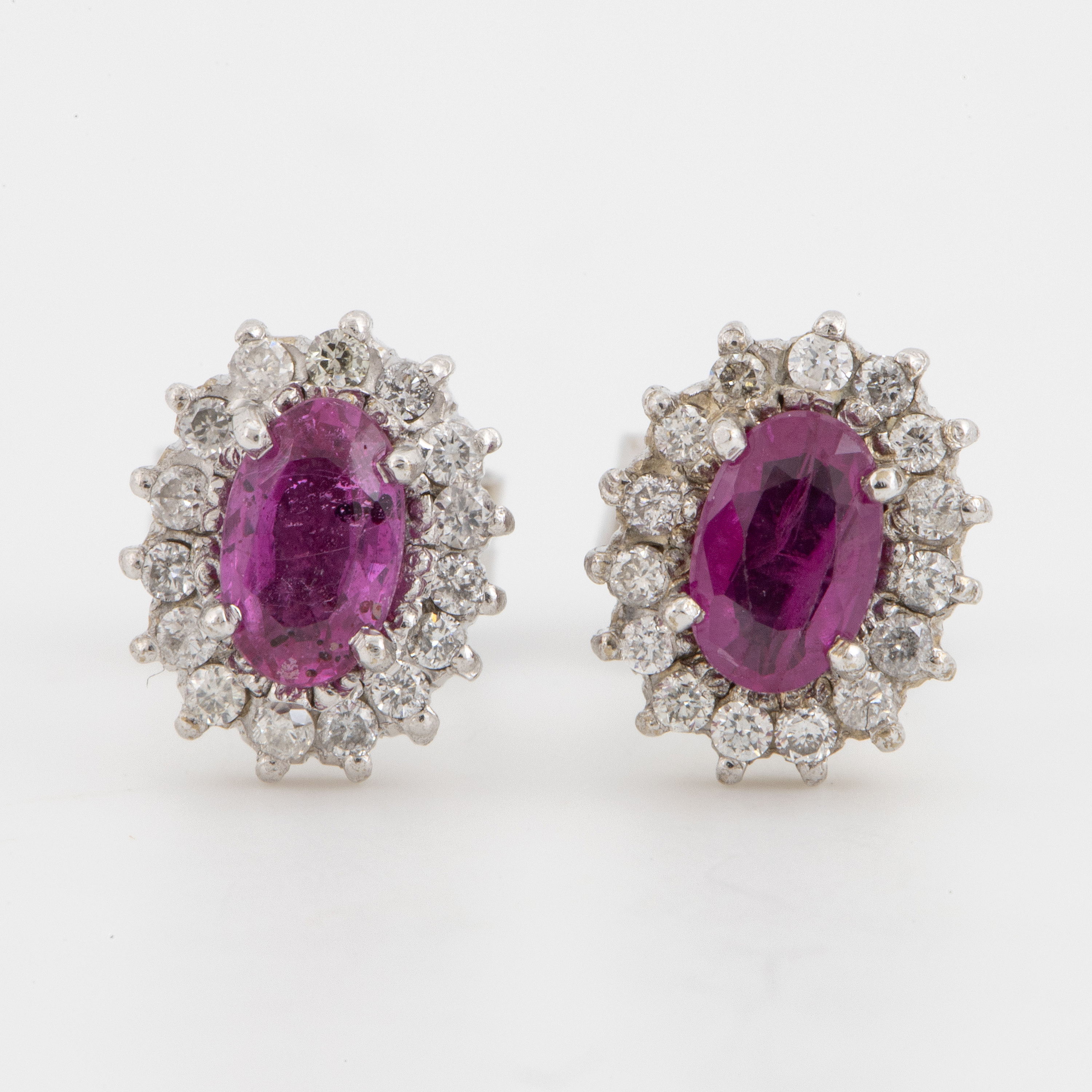 14K gold earrings with ruby and diamonds. - Bukowskis