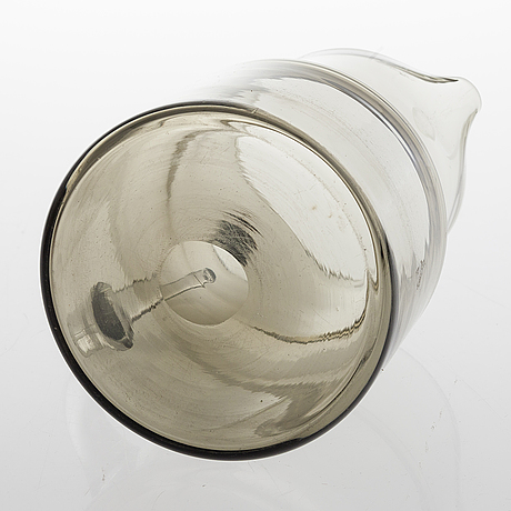 SAARA HOPEA, A glass pitcher and six glasses in rattan basket, for ...