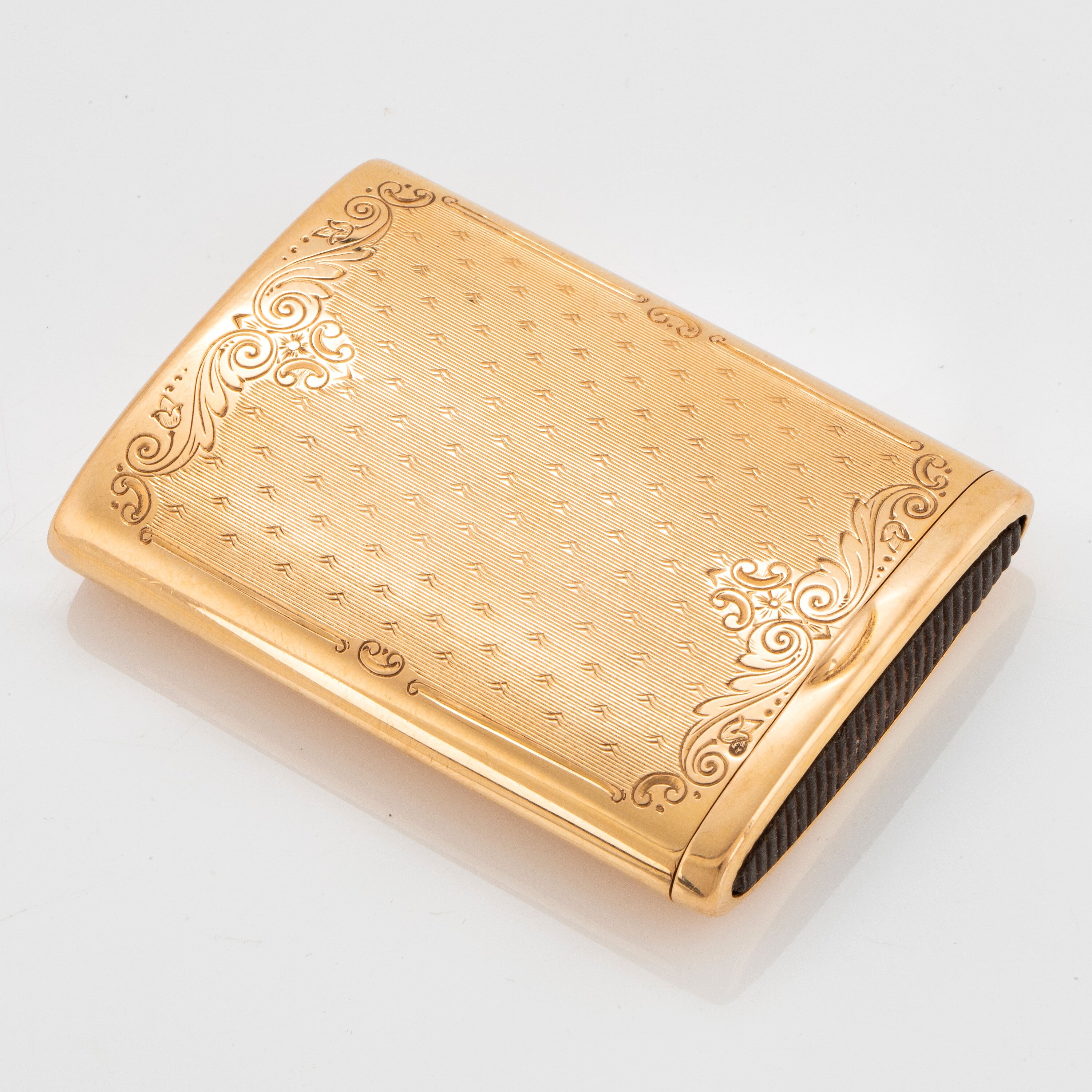 An 18K gold match box. - Bukowskis