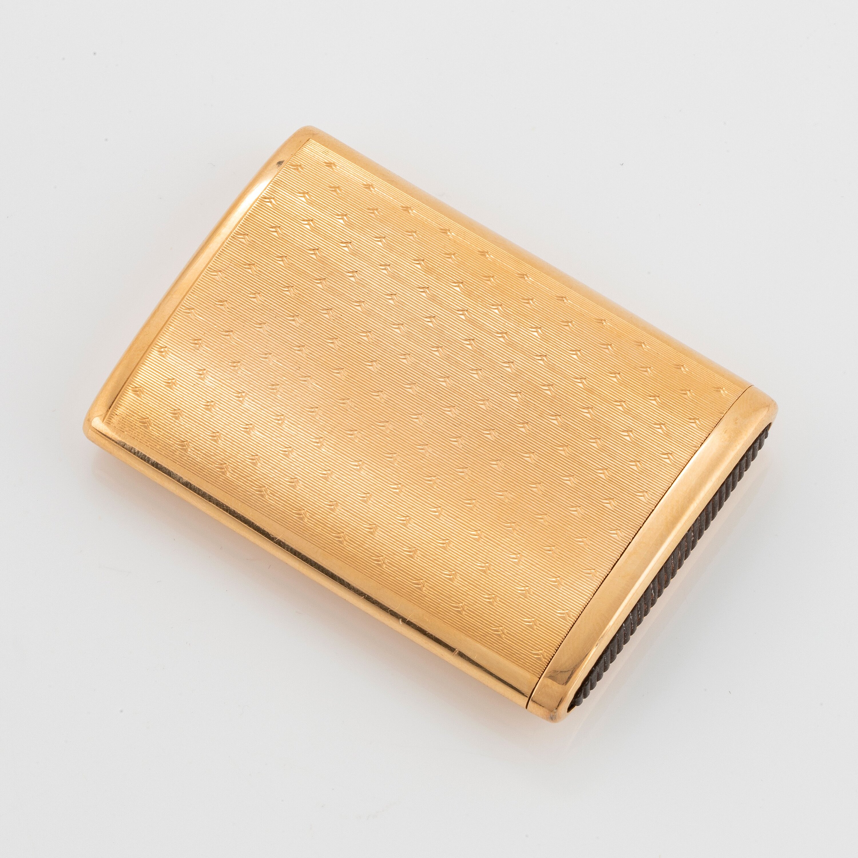 An 18K gold match box. - Bukowskis