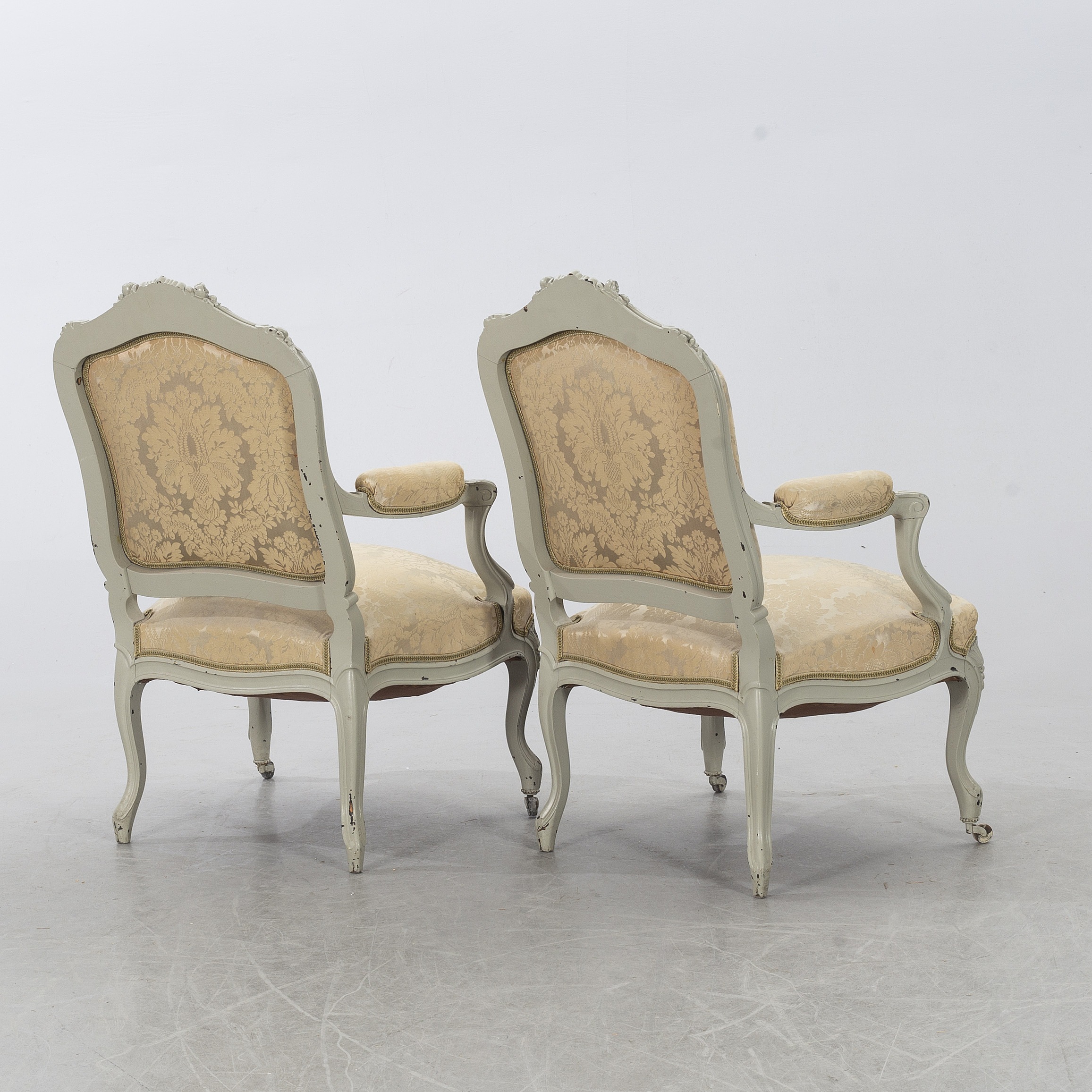A PAIR OF ROCOCO STYLE ARMCHAIRS, 19th century latter part. - Bukowskis